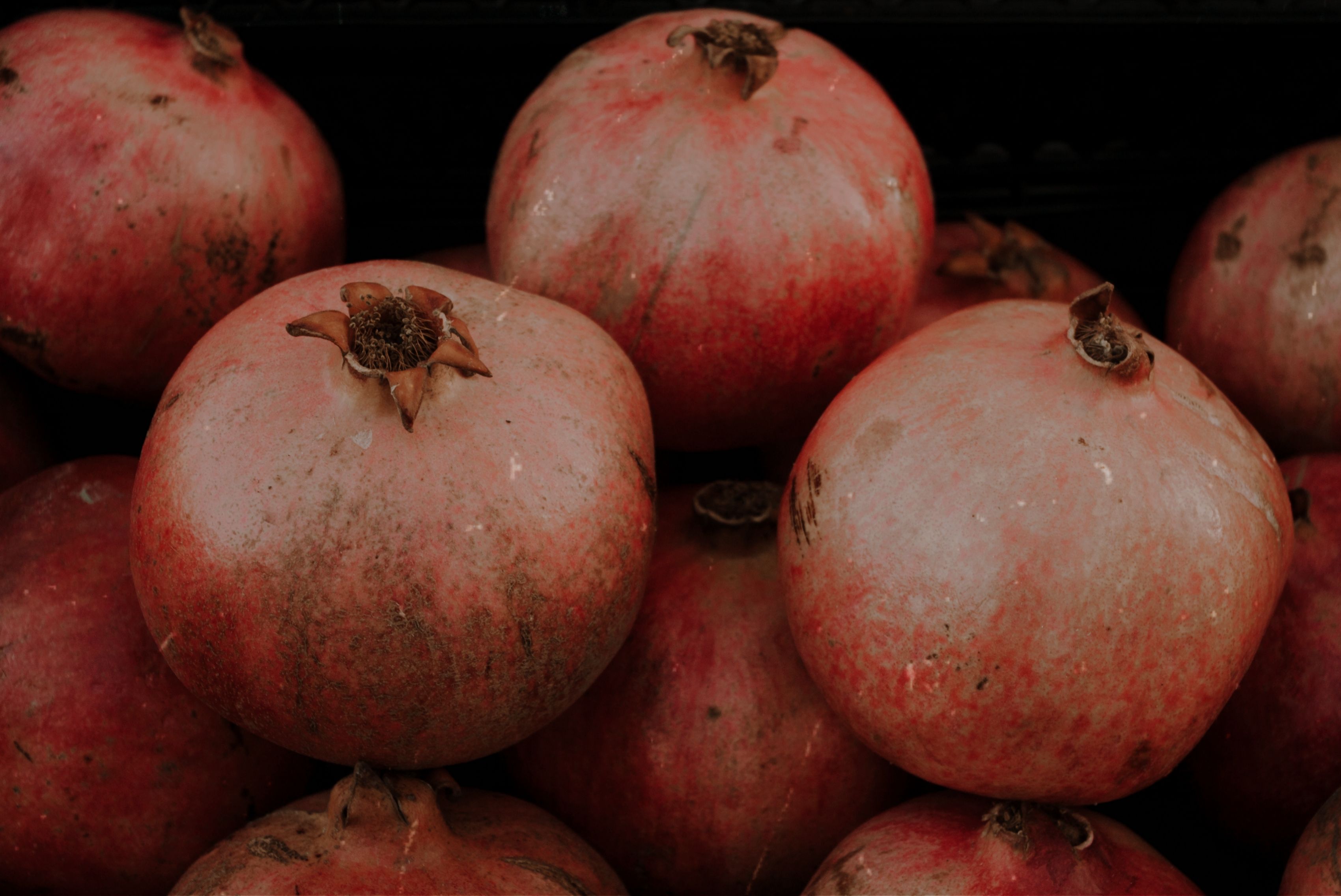 Pomegranate on Stone Floor · Free Stock Photo