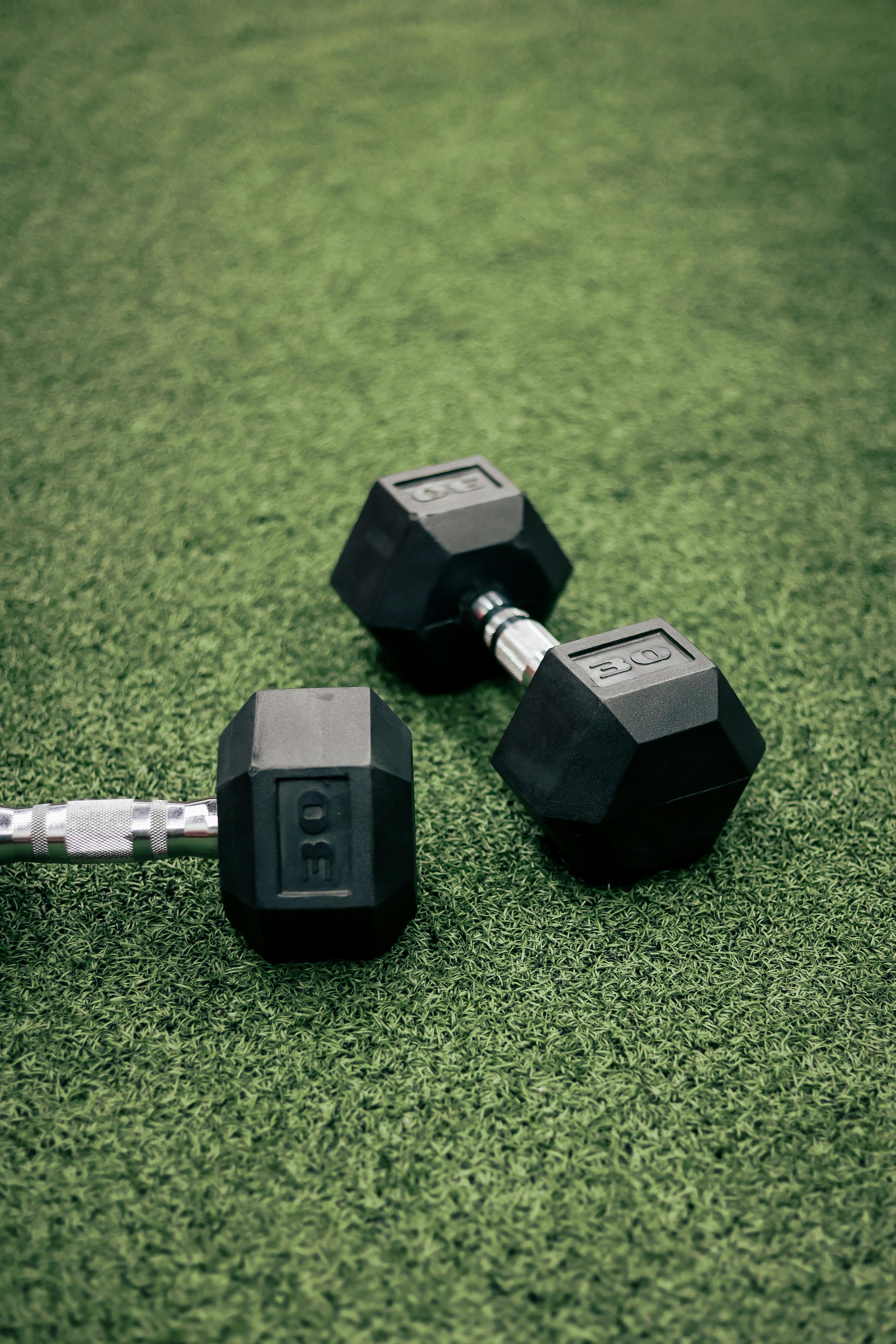 Dumbbells on the Grass · Free Stock Photo