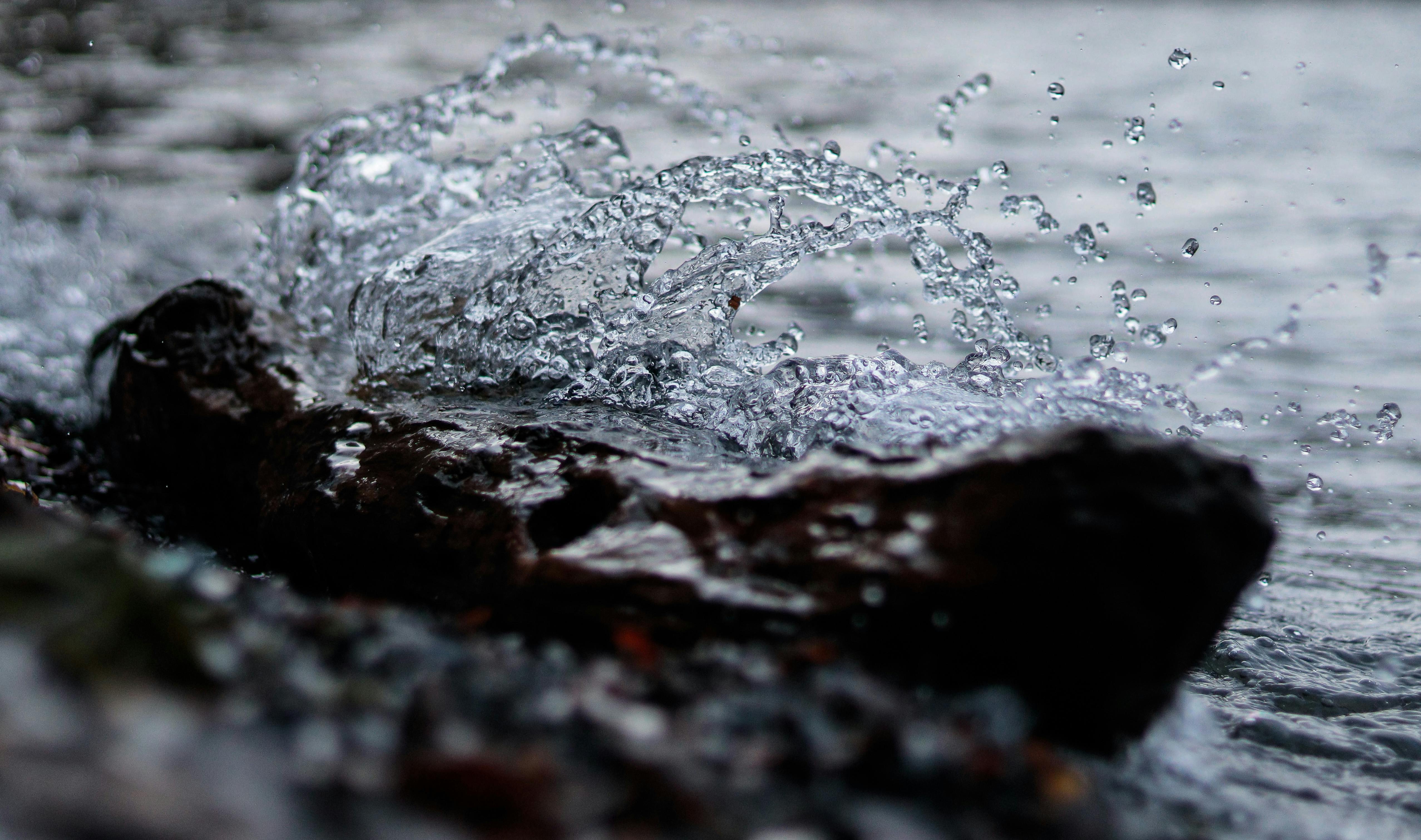 Water Splashing on a Rock · Free Stock Photo