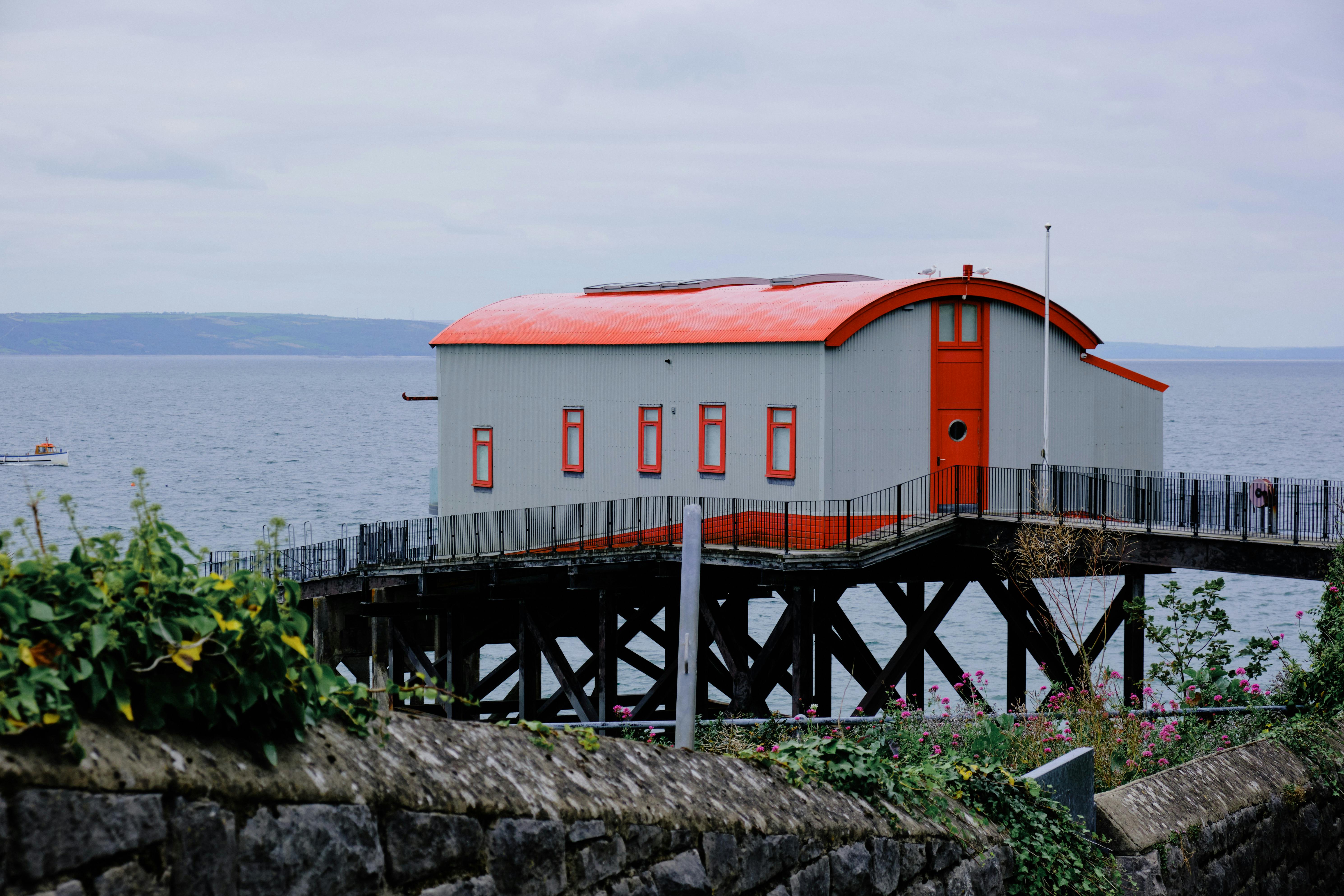 Lifeboat House on Seashore · Free Stock Photo