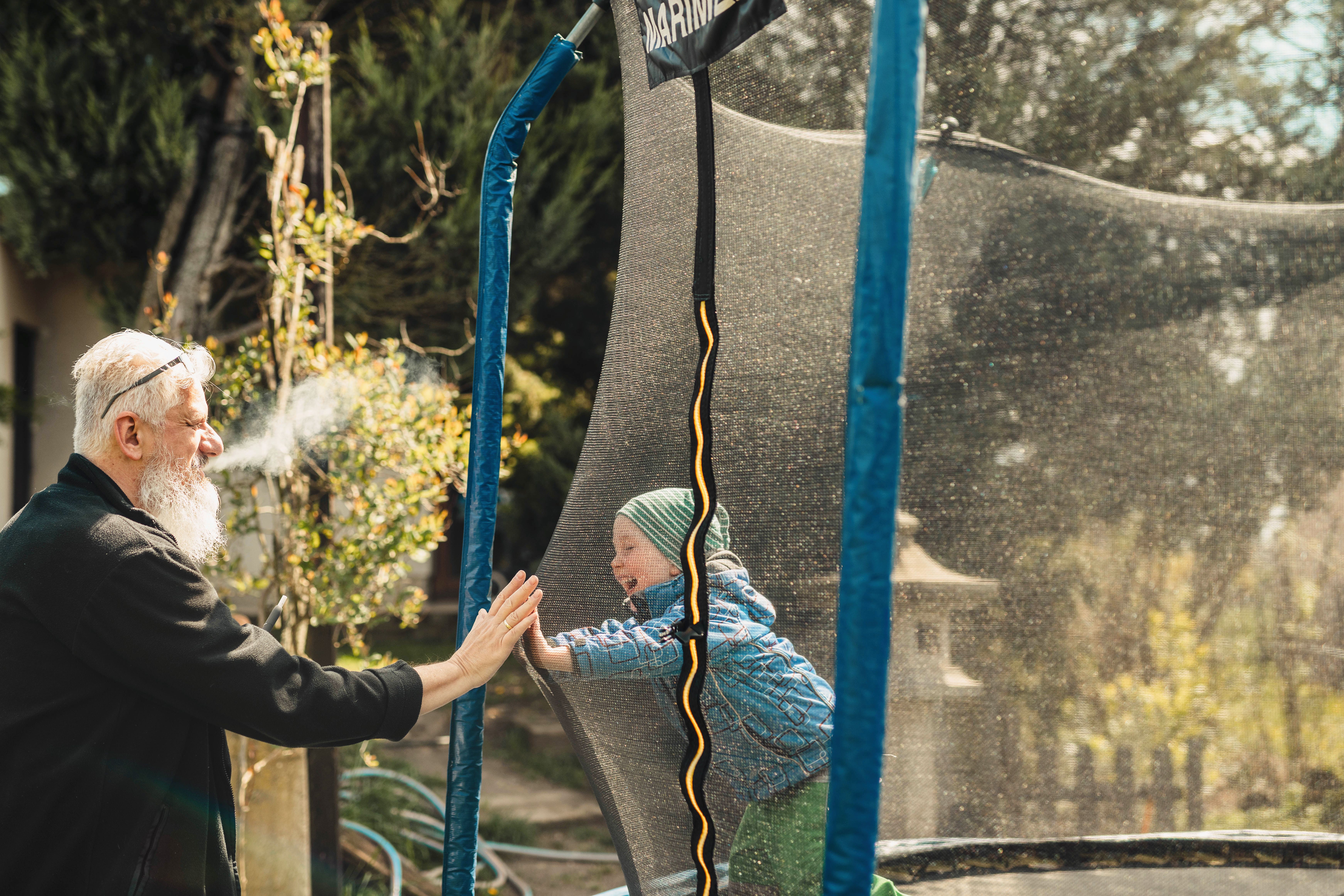 Grandfather Playing with Grandson · Free Stock Photo
