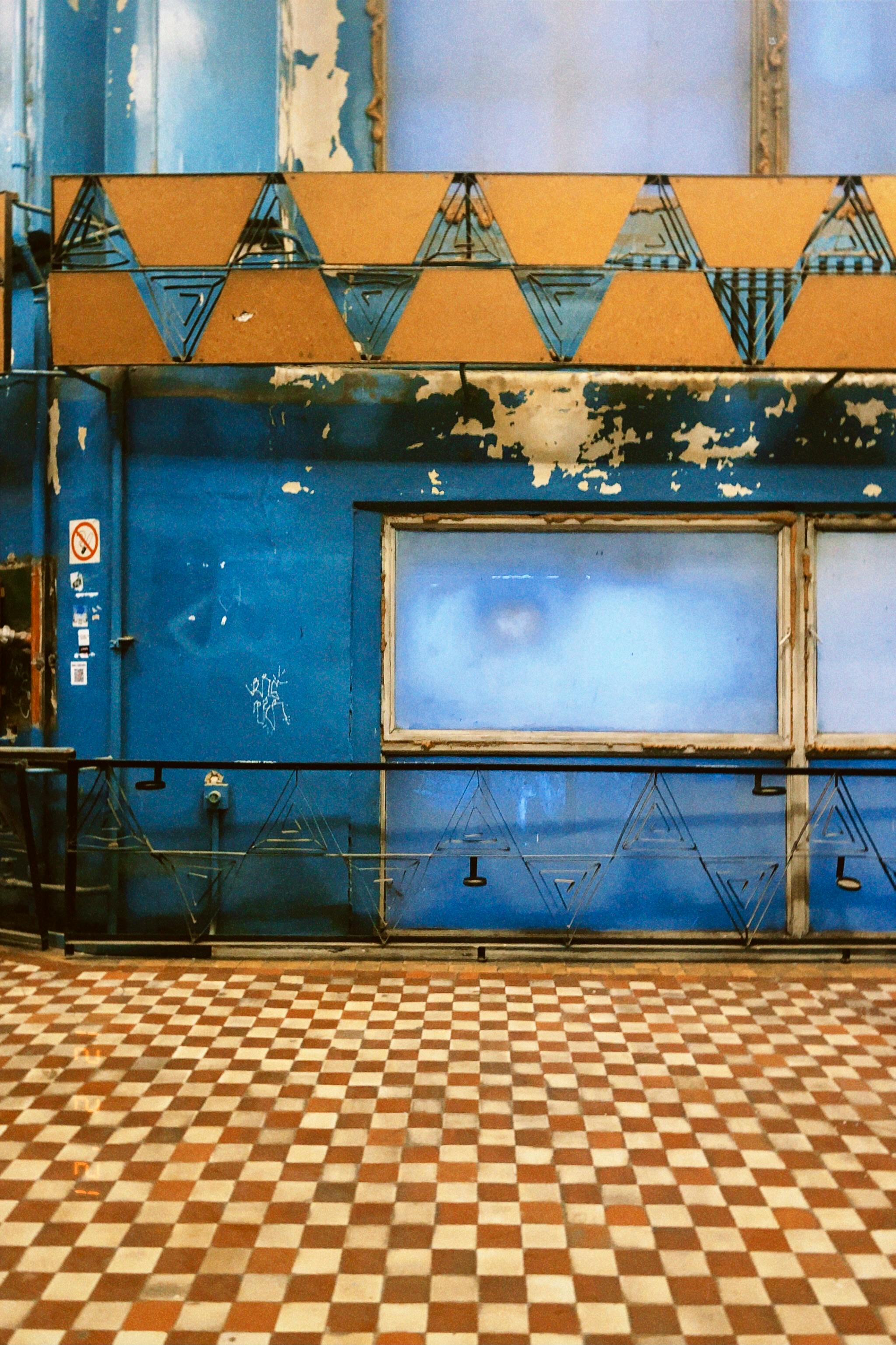 Blue Building with Checkered Floor · Free Stock Photo