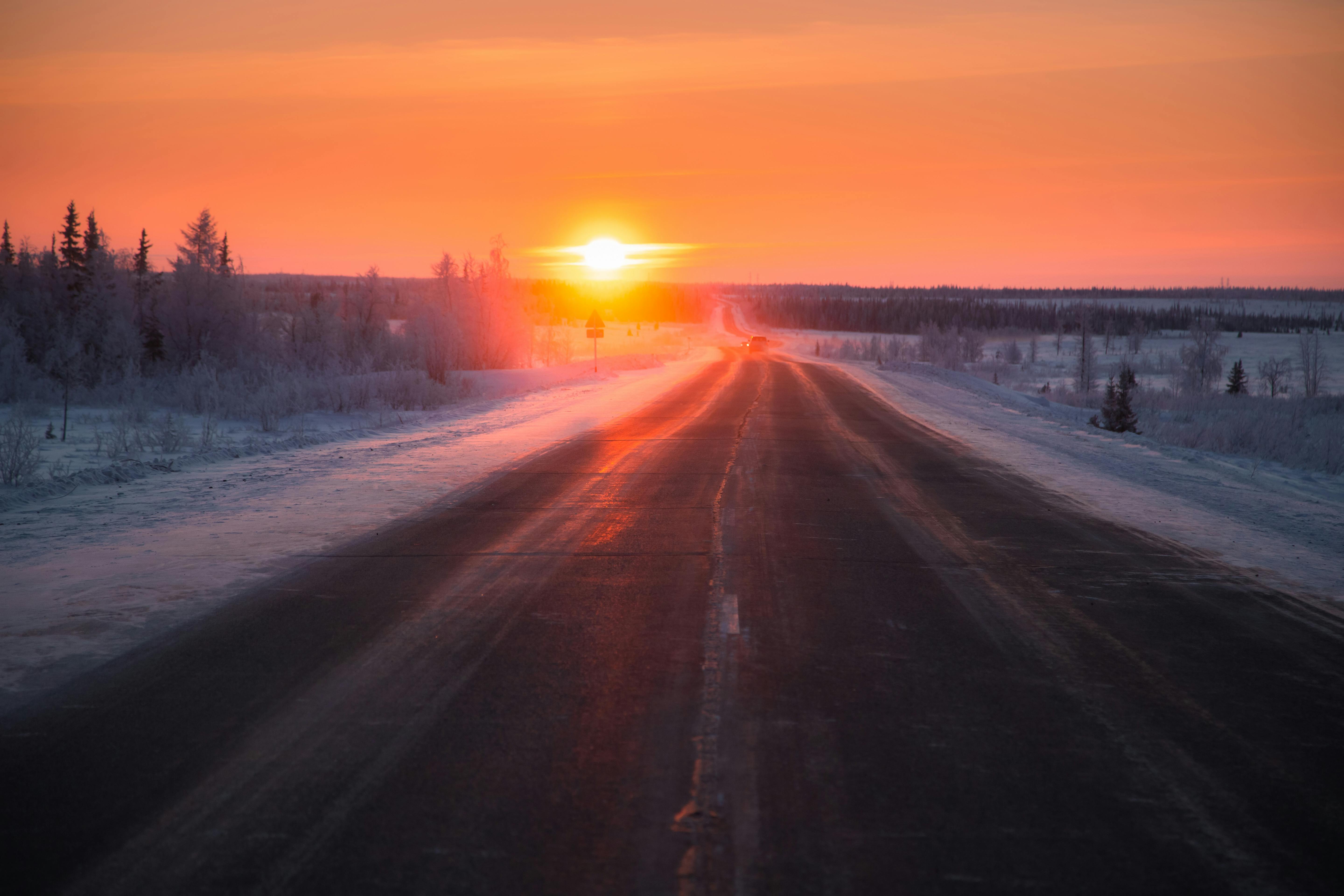 Photo of a Road at Sunset · Free Stock Photo