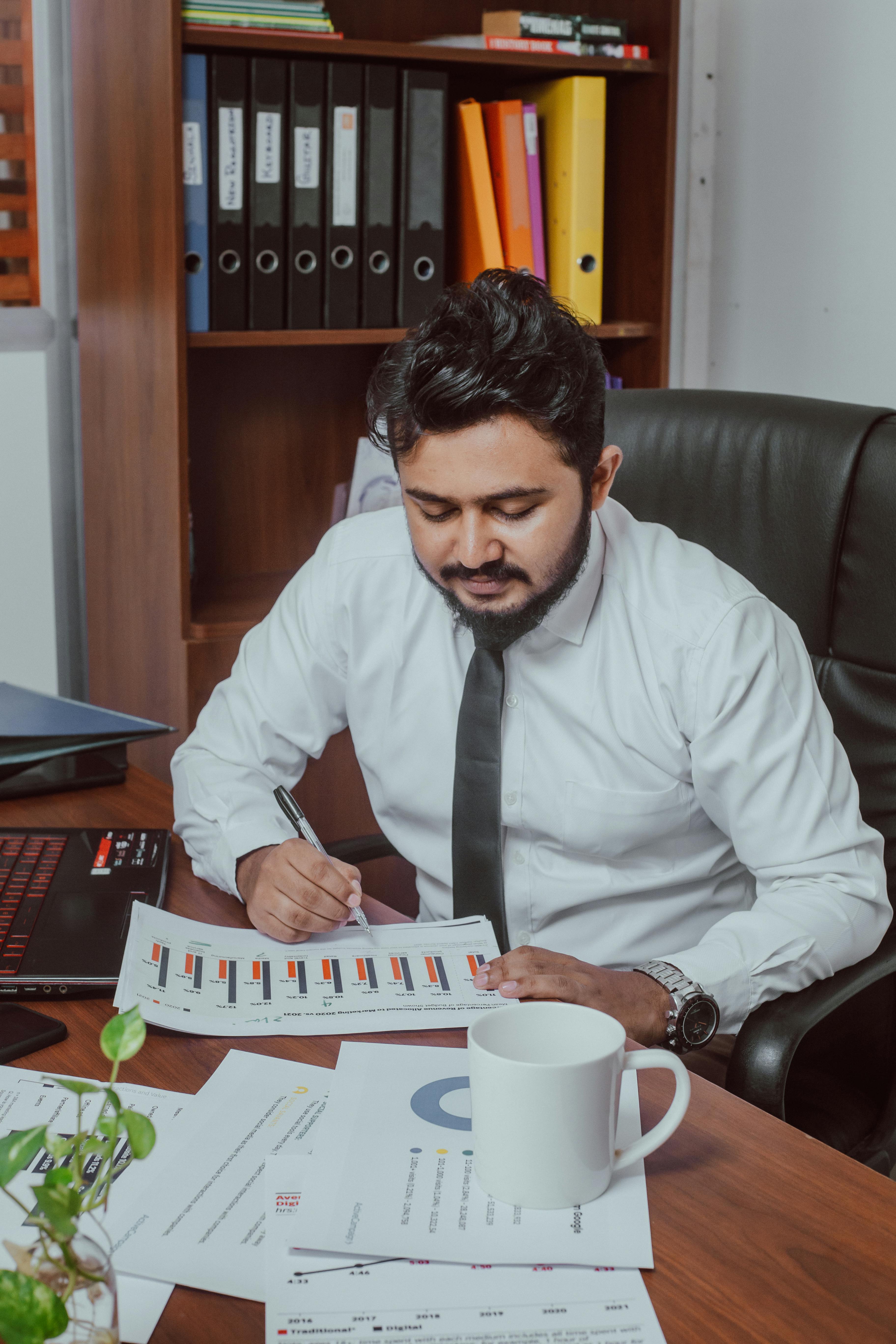 Man Interviewing the Woman Applying for Job · Free Stock Photo