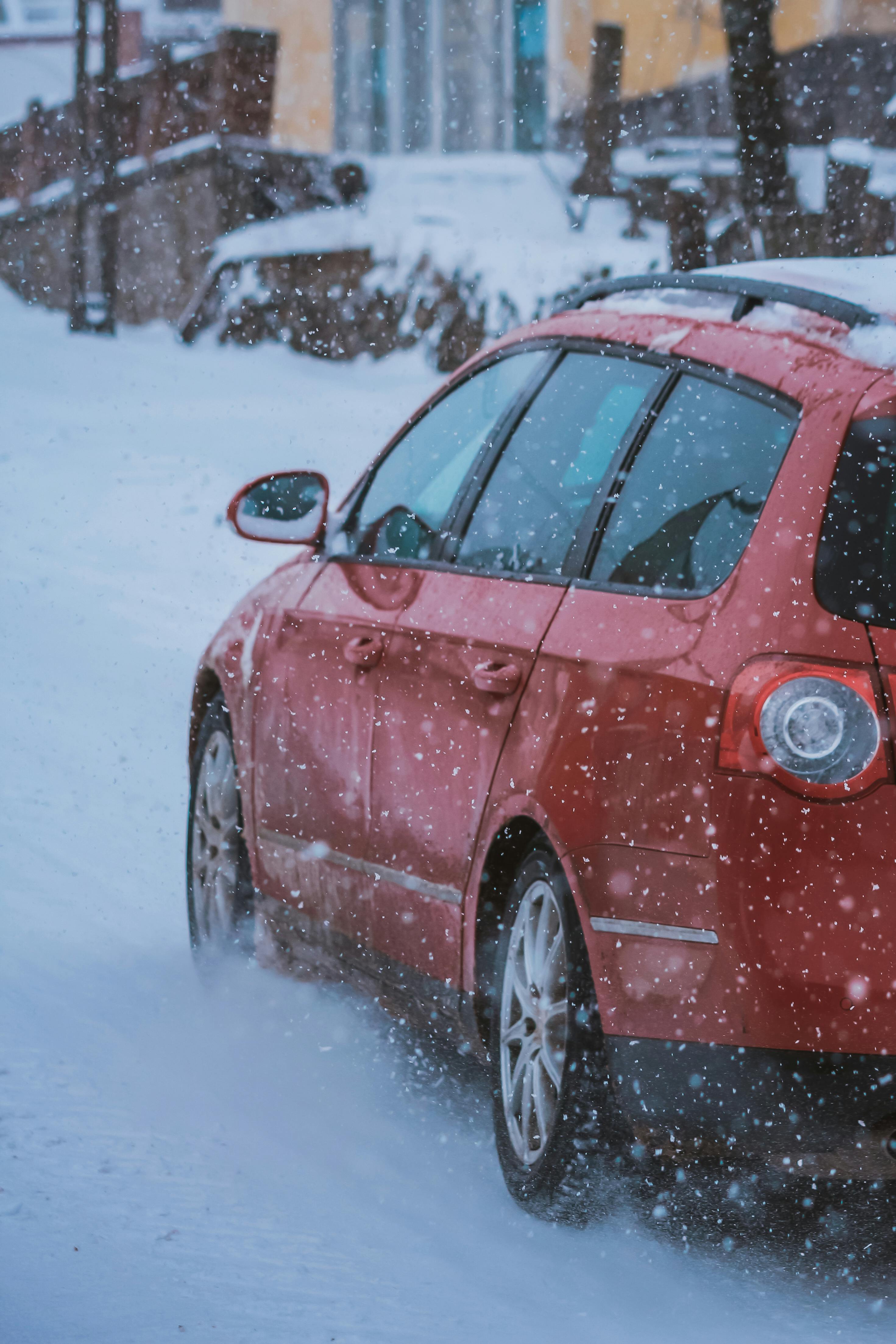 Car on City Street on Winter Day · Free Stock Photo