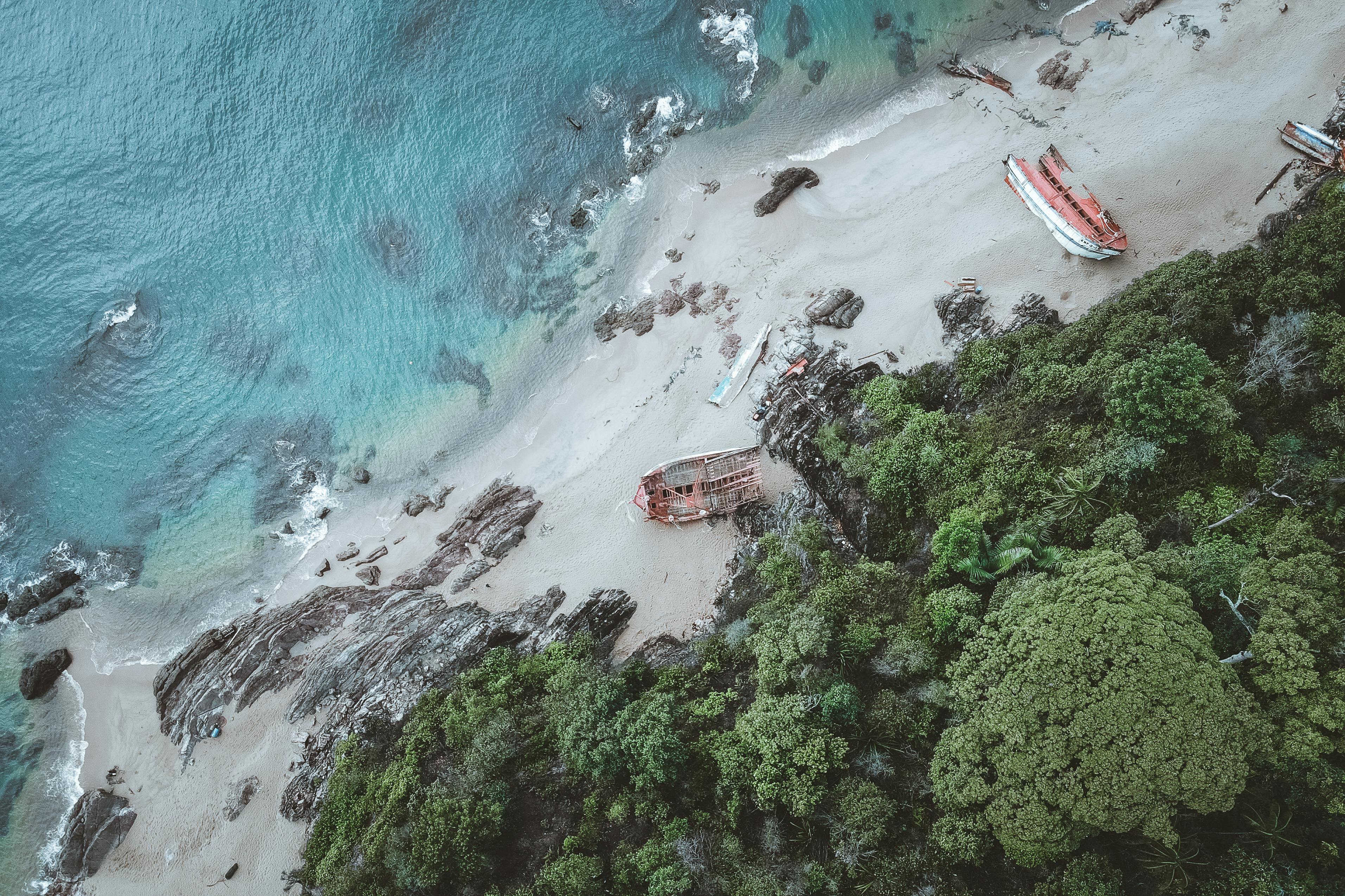 Drone Shot of a Coast with Shipwrecks · Free Stock Photo