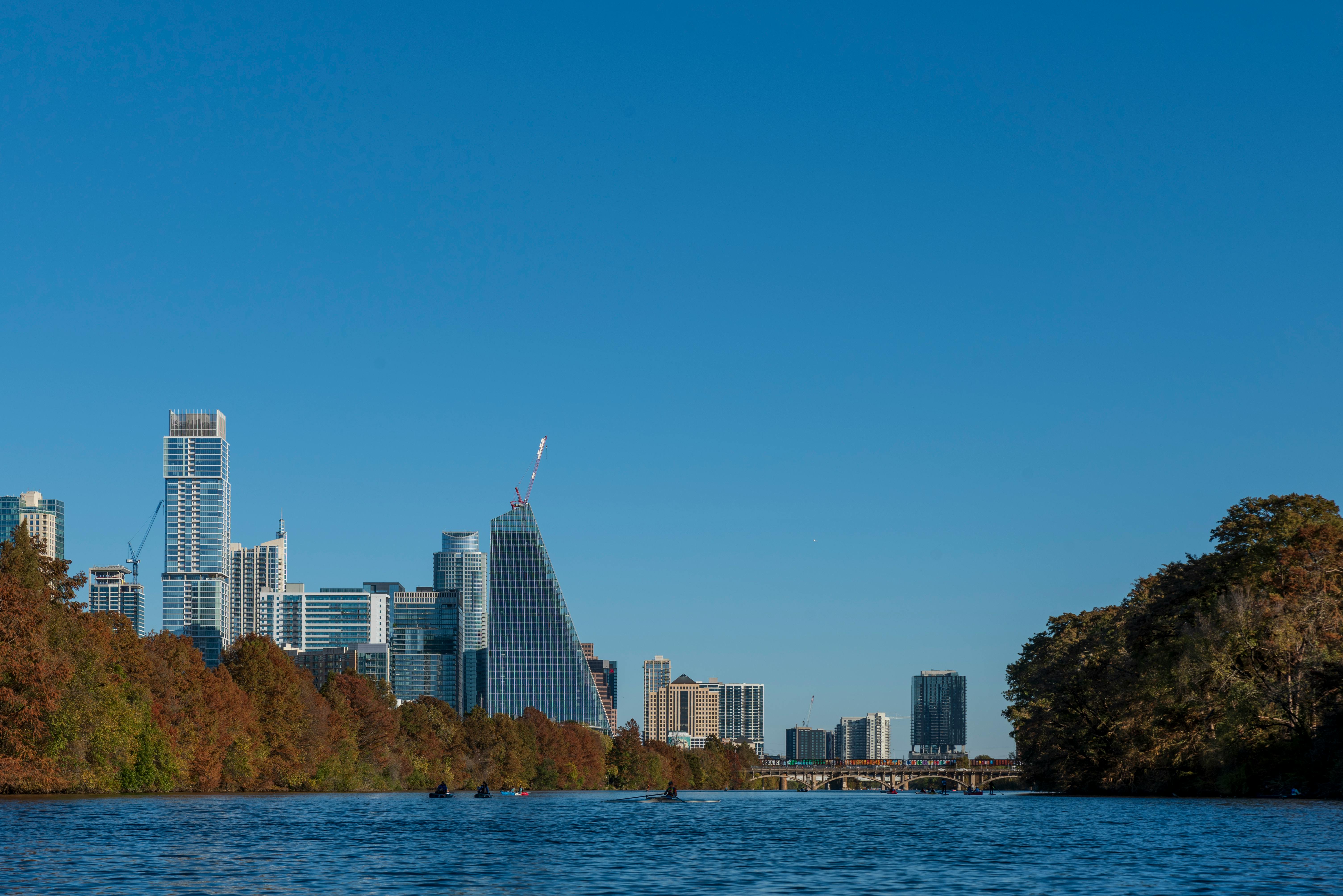 Body Of Water Near High-rise Buildings · Free Stock Photo