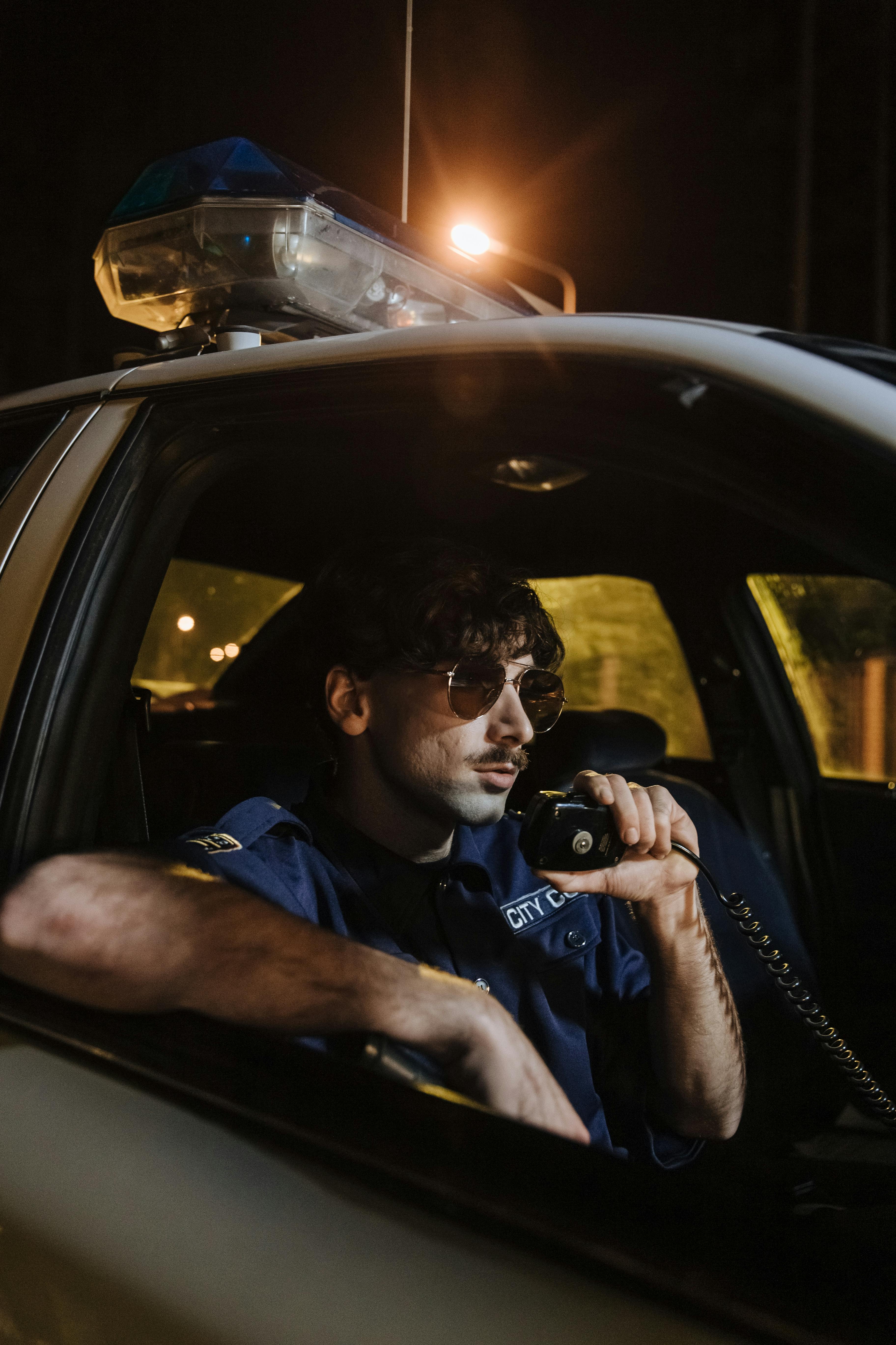 Police Car on the Street · Free Stock Photo
