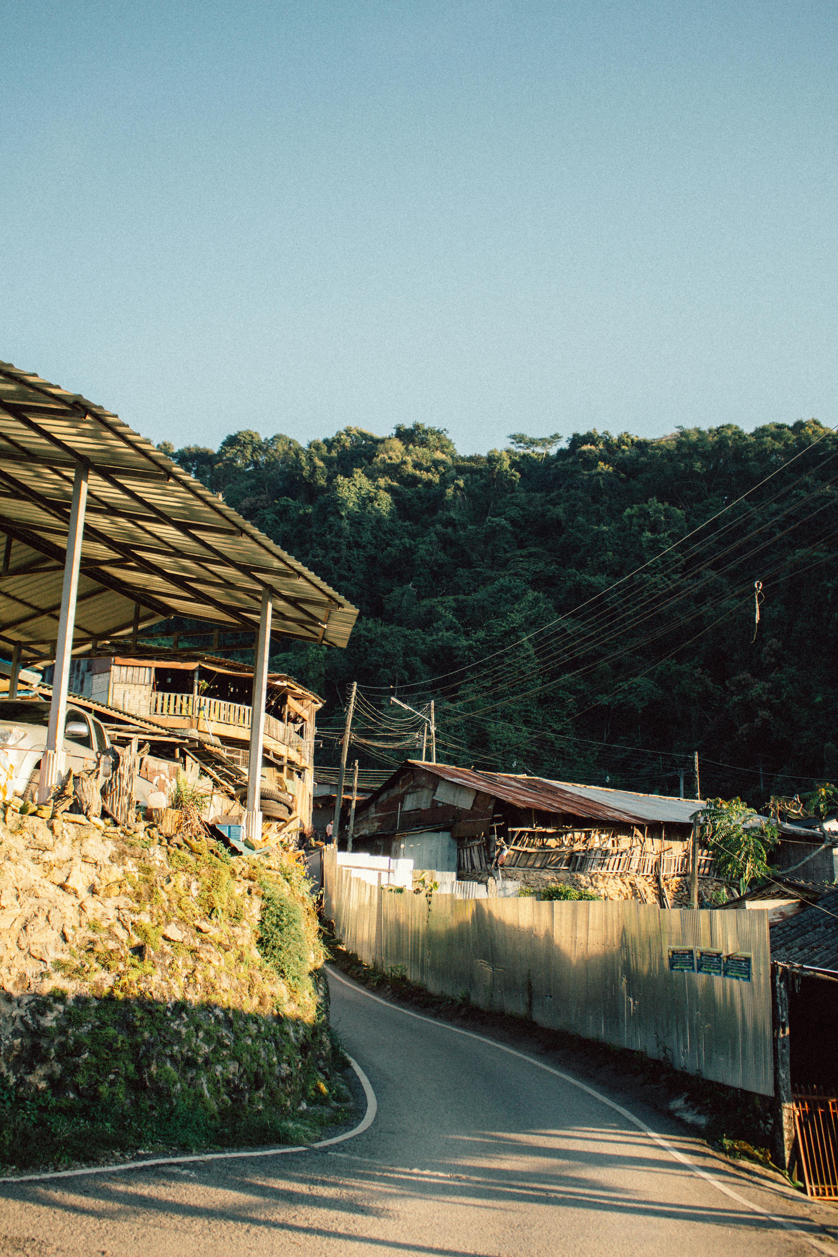Empty Road Between Houses · Free Stock Photo