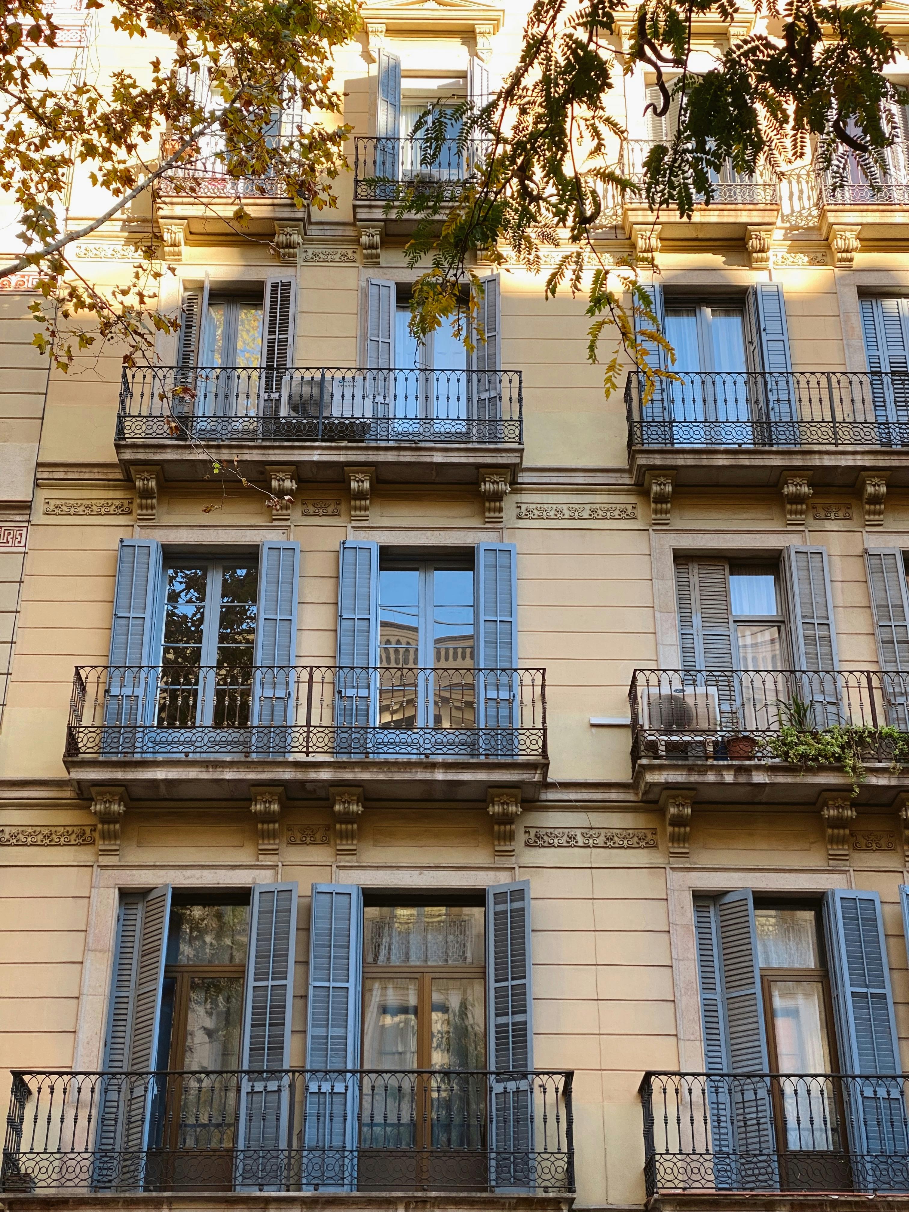 Multi-colored Concrete Building · Free Stock Photo