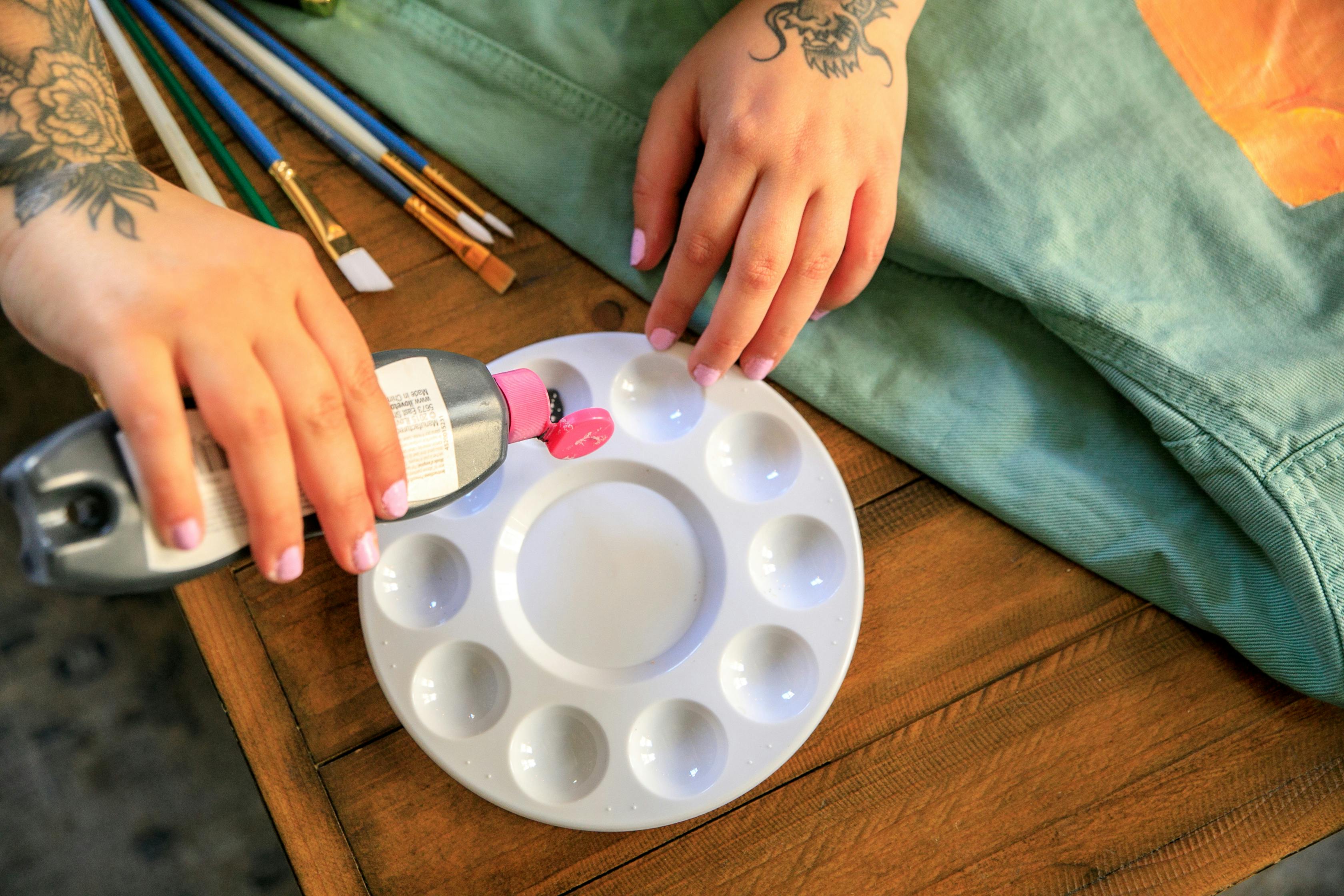 Artist Using Art Supplies · Free Stock Photo