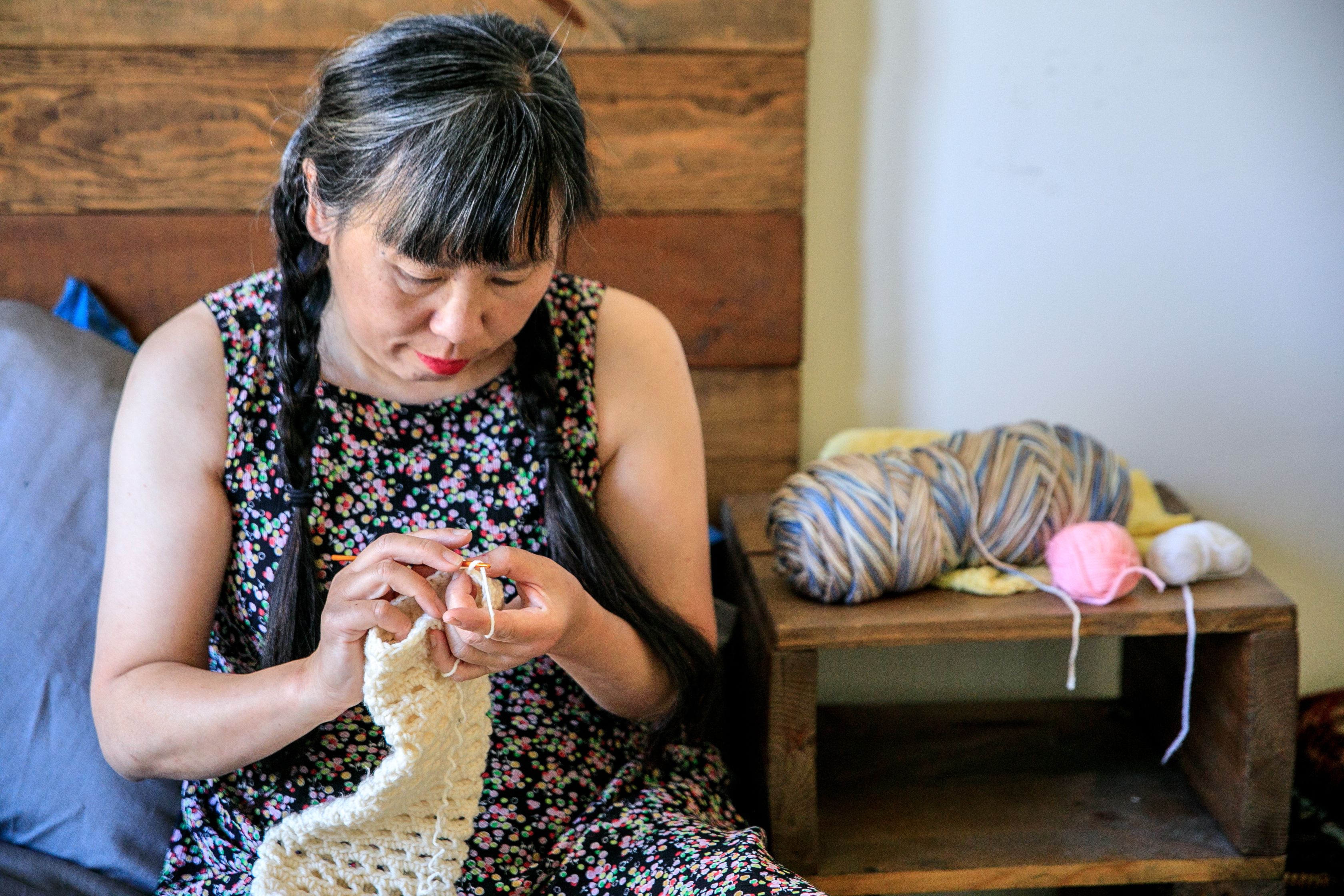 Woman Sitting and Knitting · Free Stock Photo
