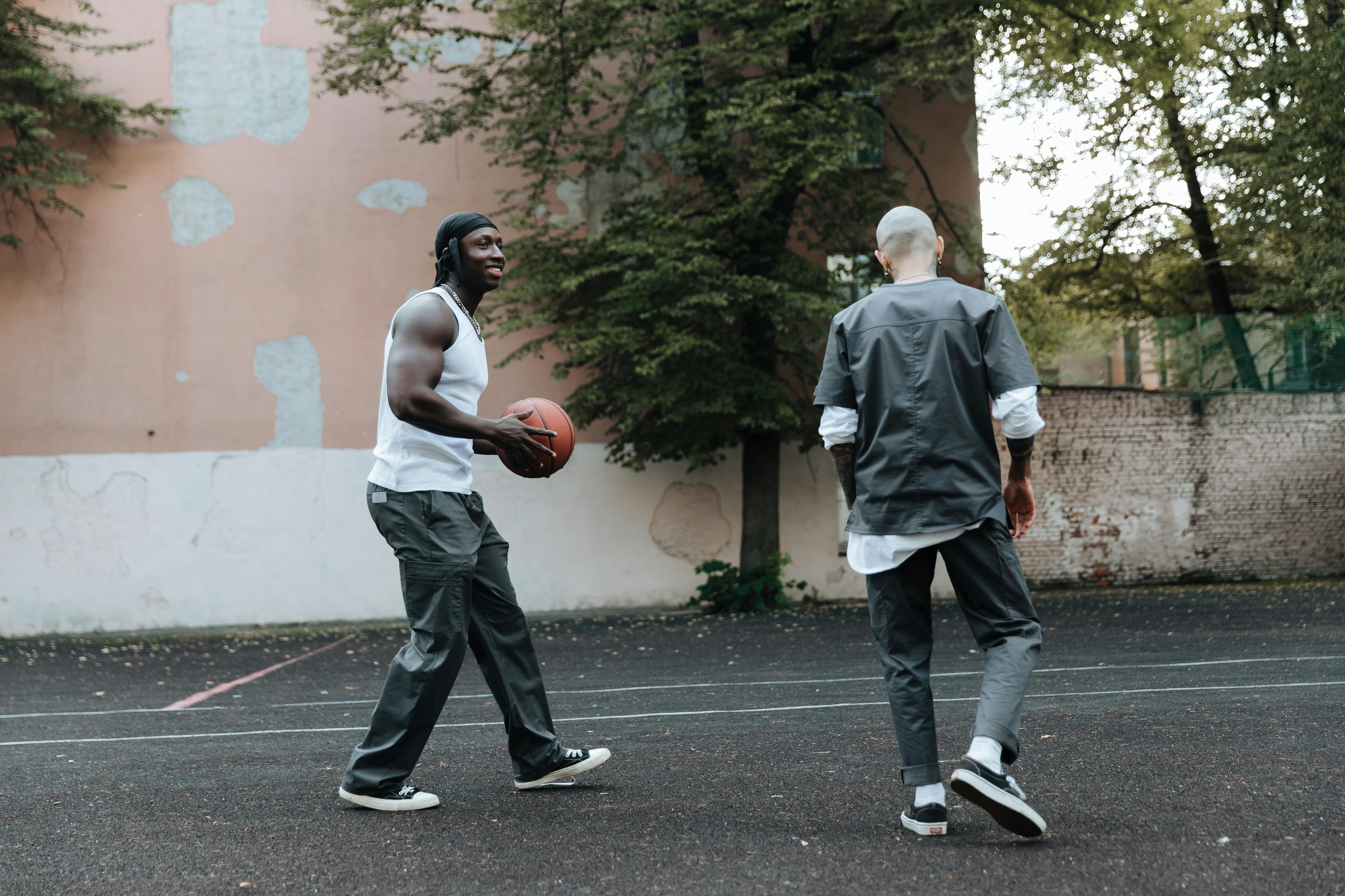 Two Men Playing Basketball · Free Stock Photo