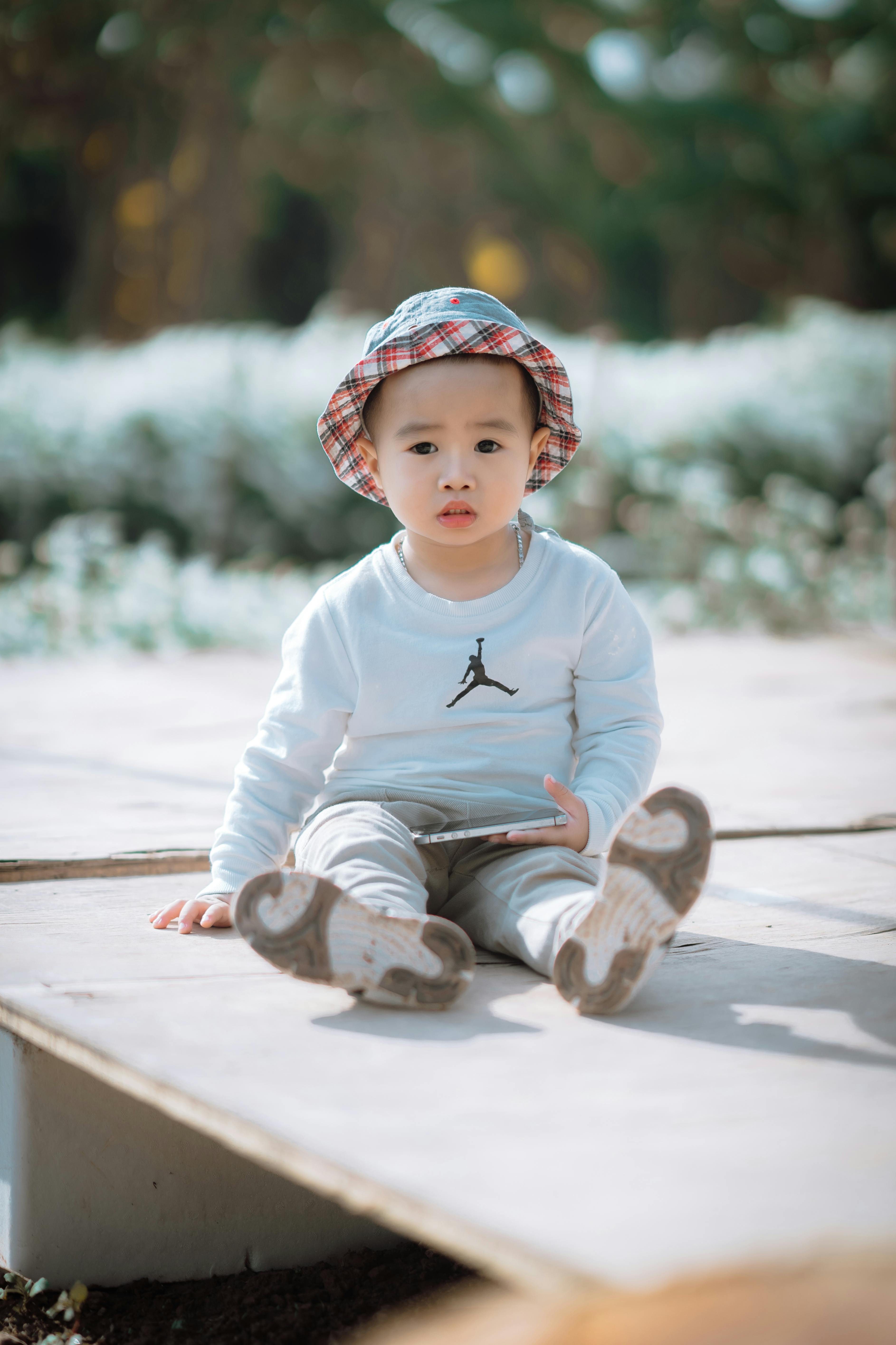Cute Baby Girl with a Dummy in Her Mouth · Free Stock Photo