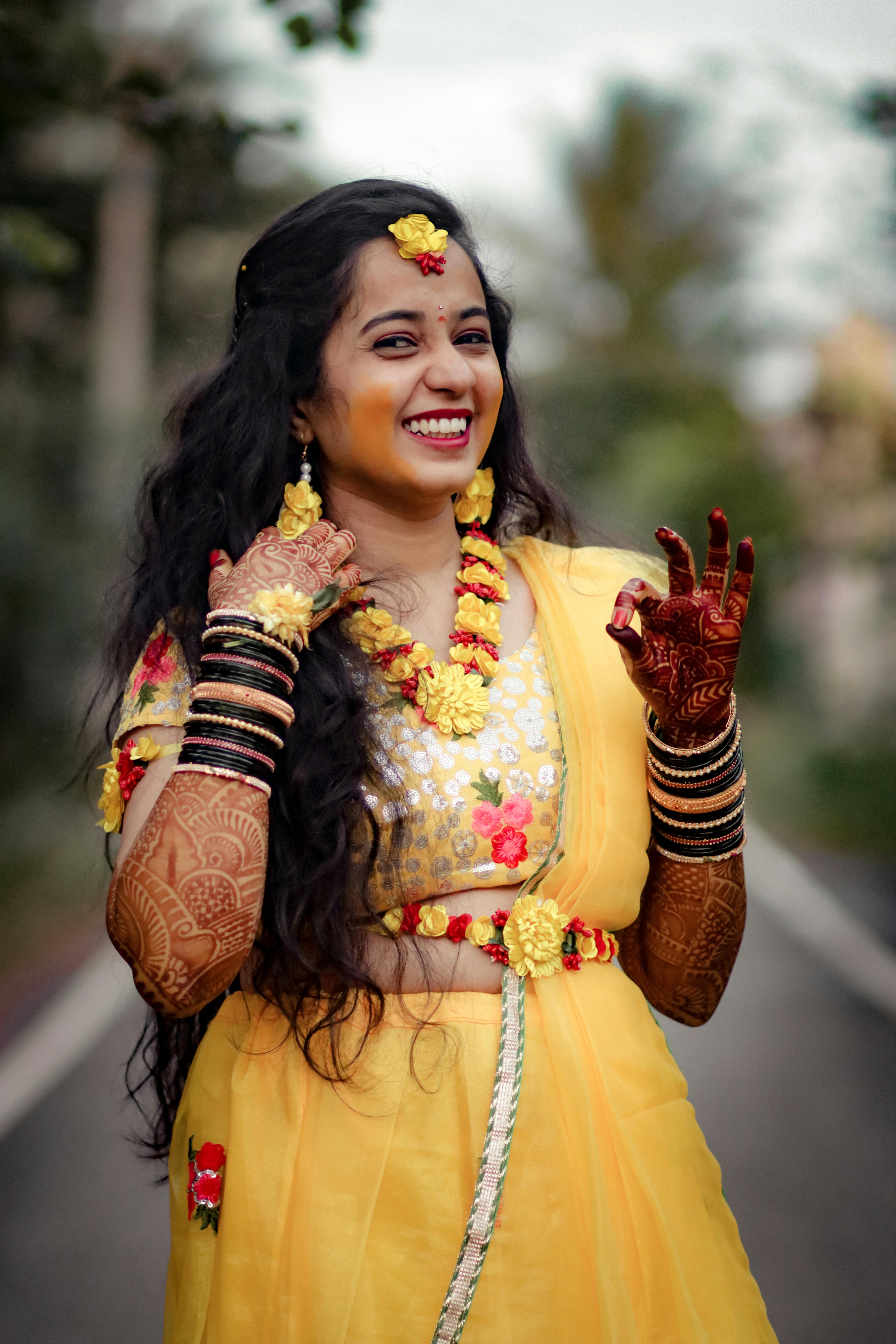 Women in Traditional Bright Colored Cloak · Free Stock Photo