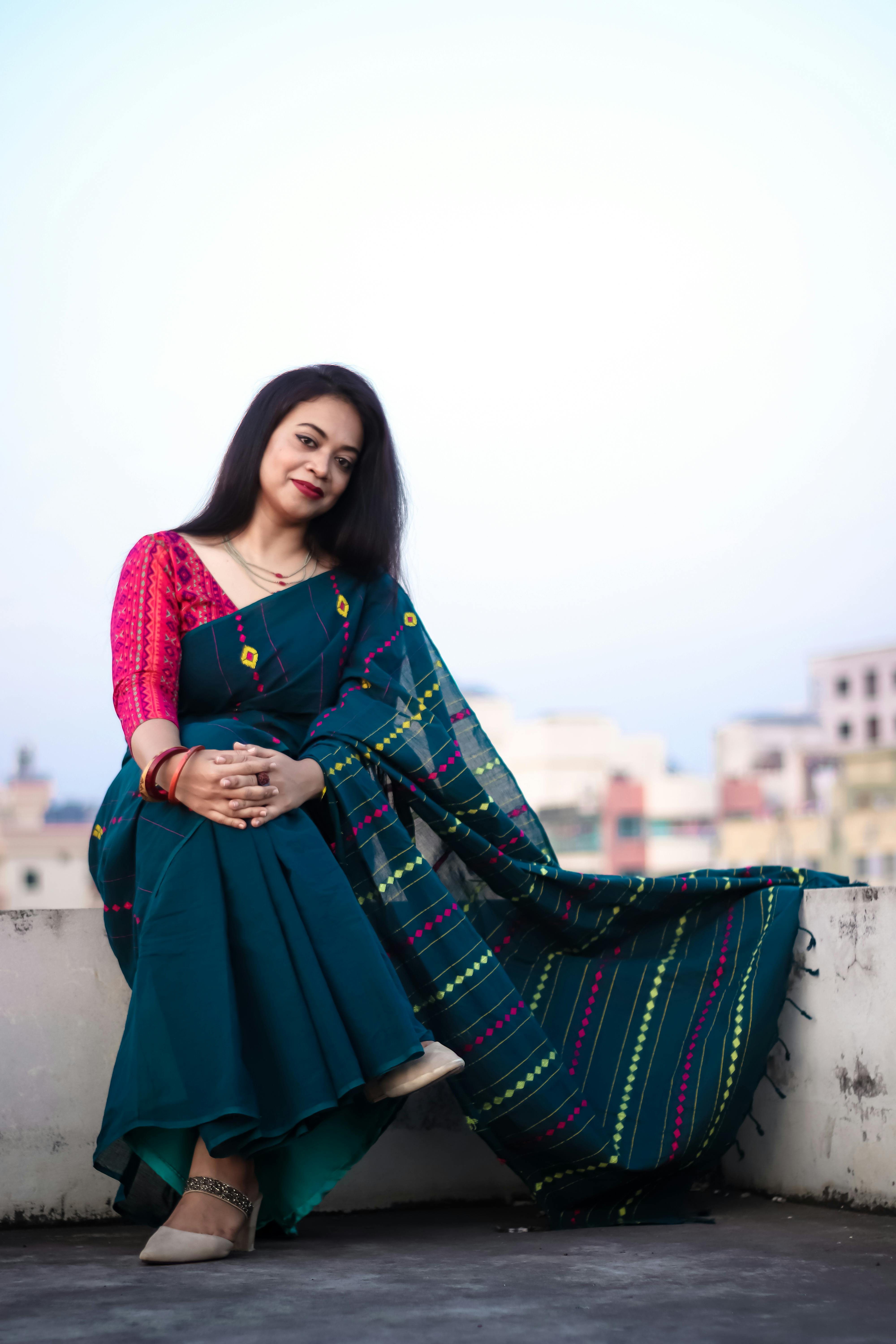 Woman Sitting Wearing Traditional Saree · Free Stock Photo