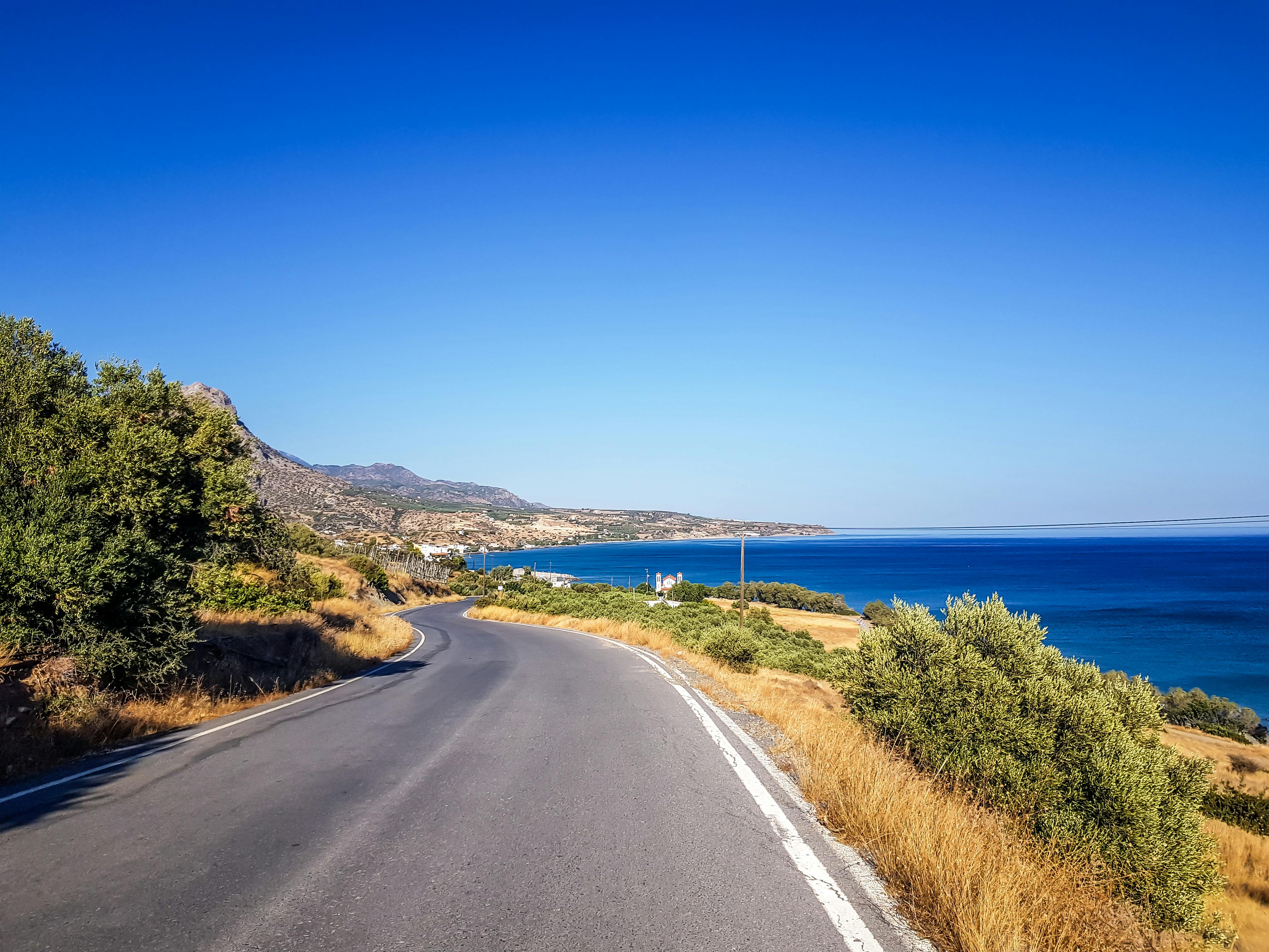 Grey Concrete Road in the Middle of the Sea · Free Stock Photo