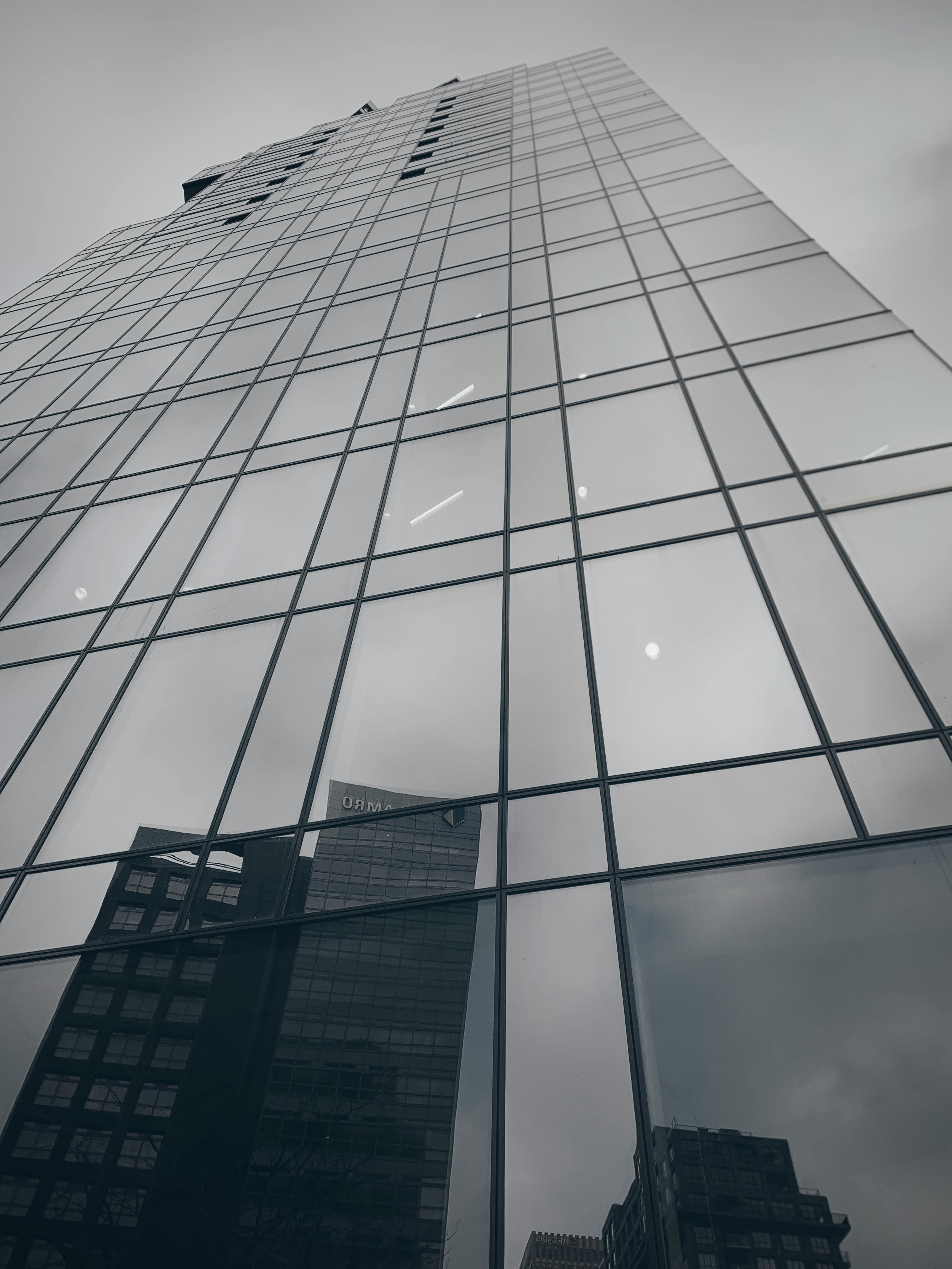 Glass Panels of Modern High Rise Building · Free Stock Photo