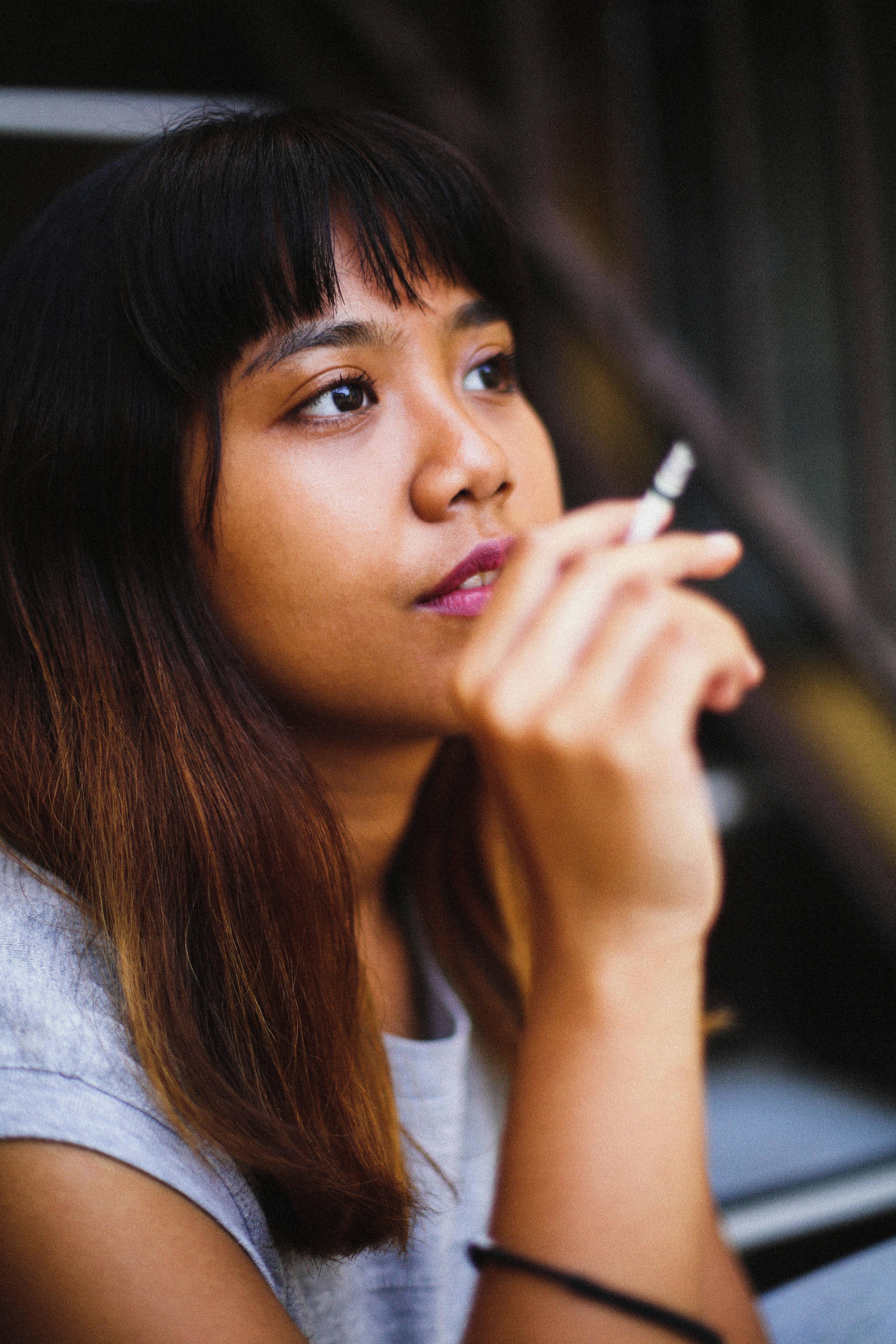 Person Smoking Cigarette · Free Stock Photo