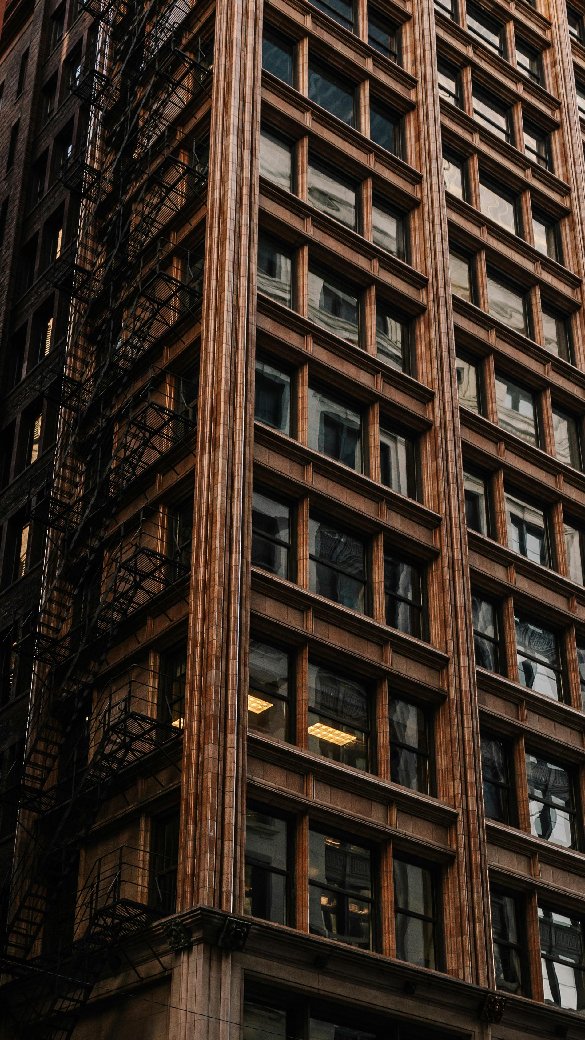 Tall Building with Glass Windows · Free Stock Photo