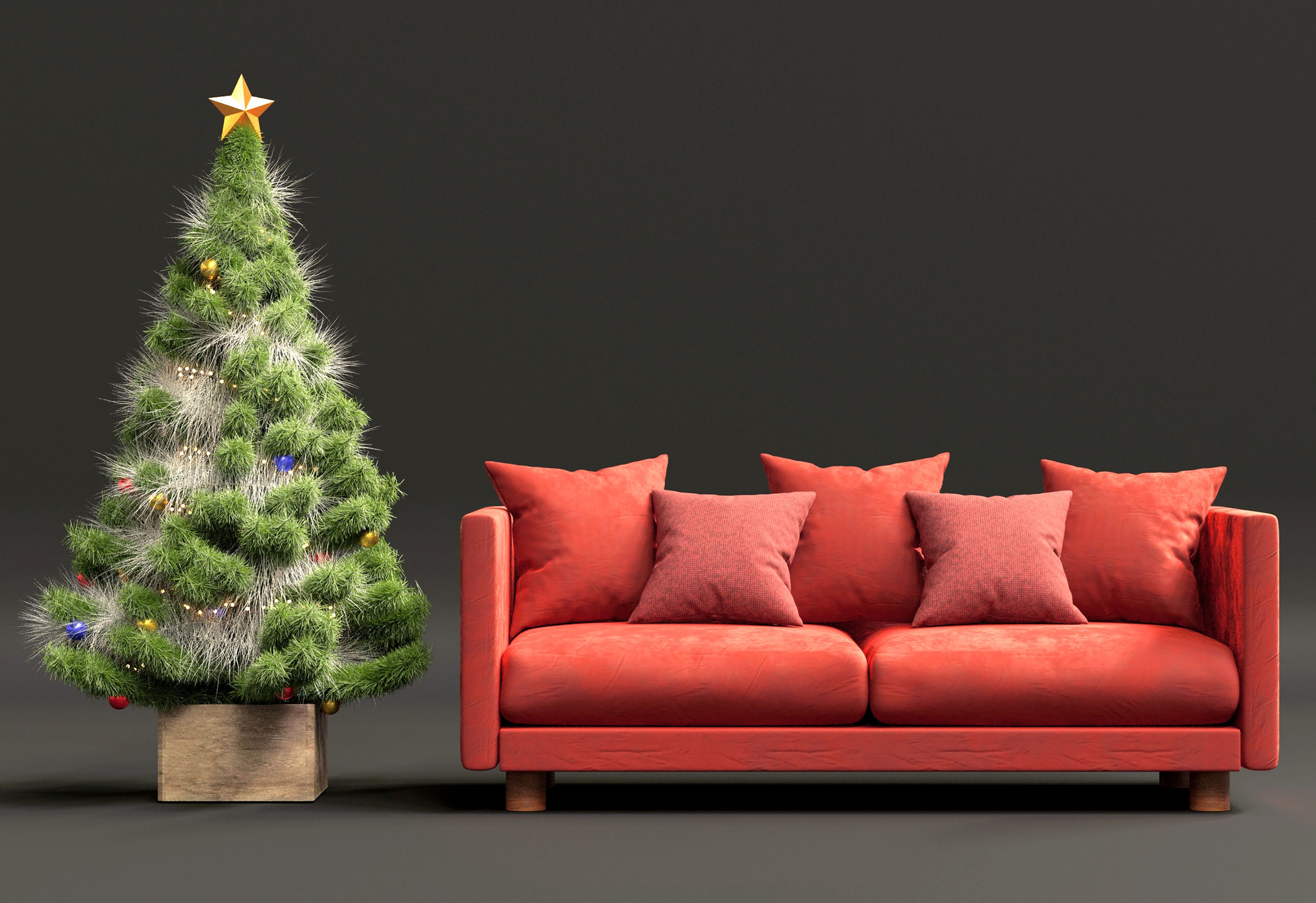 A Red Couch Next to a Christmas Tree · Free Stock Photo