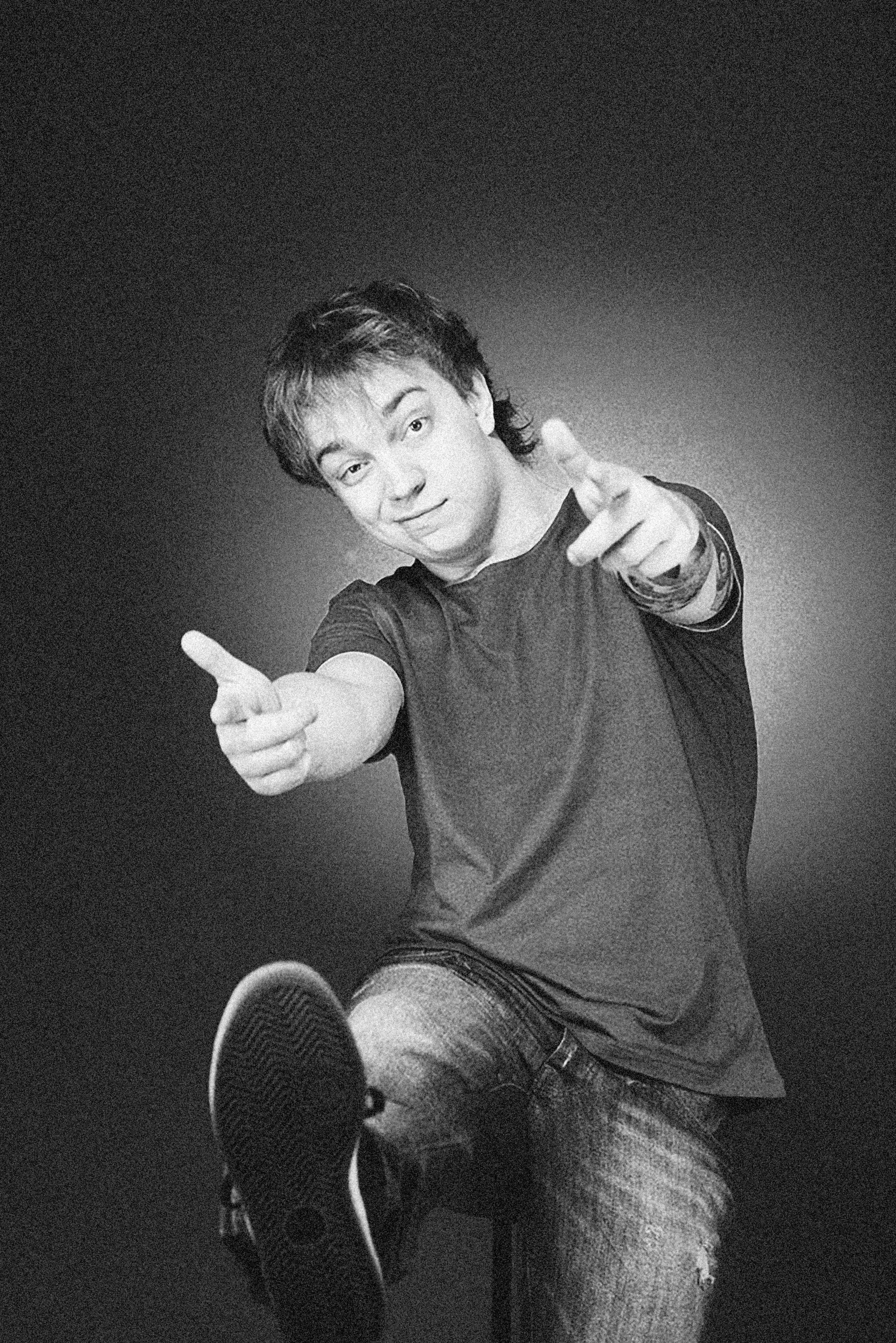 Rapper Making Yes Hand Gesture · Free Stock Photo