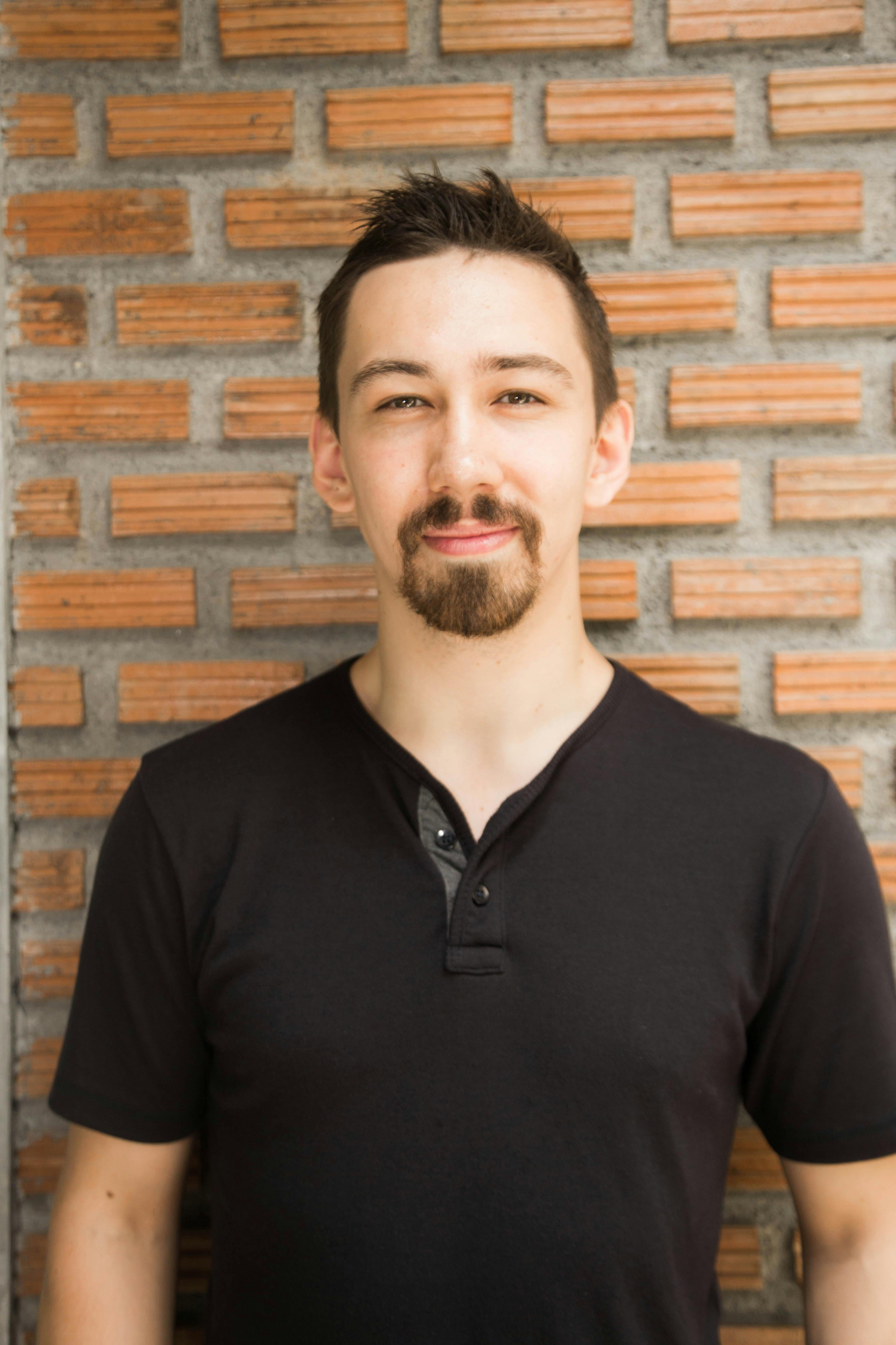 Bearded Man in Metal Prison Bar · Free Stock Photo