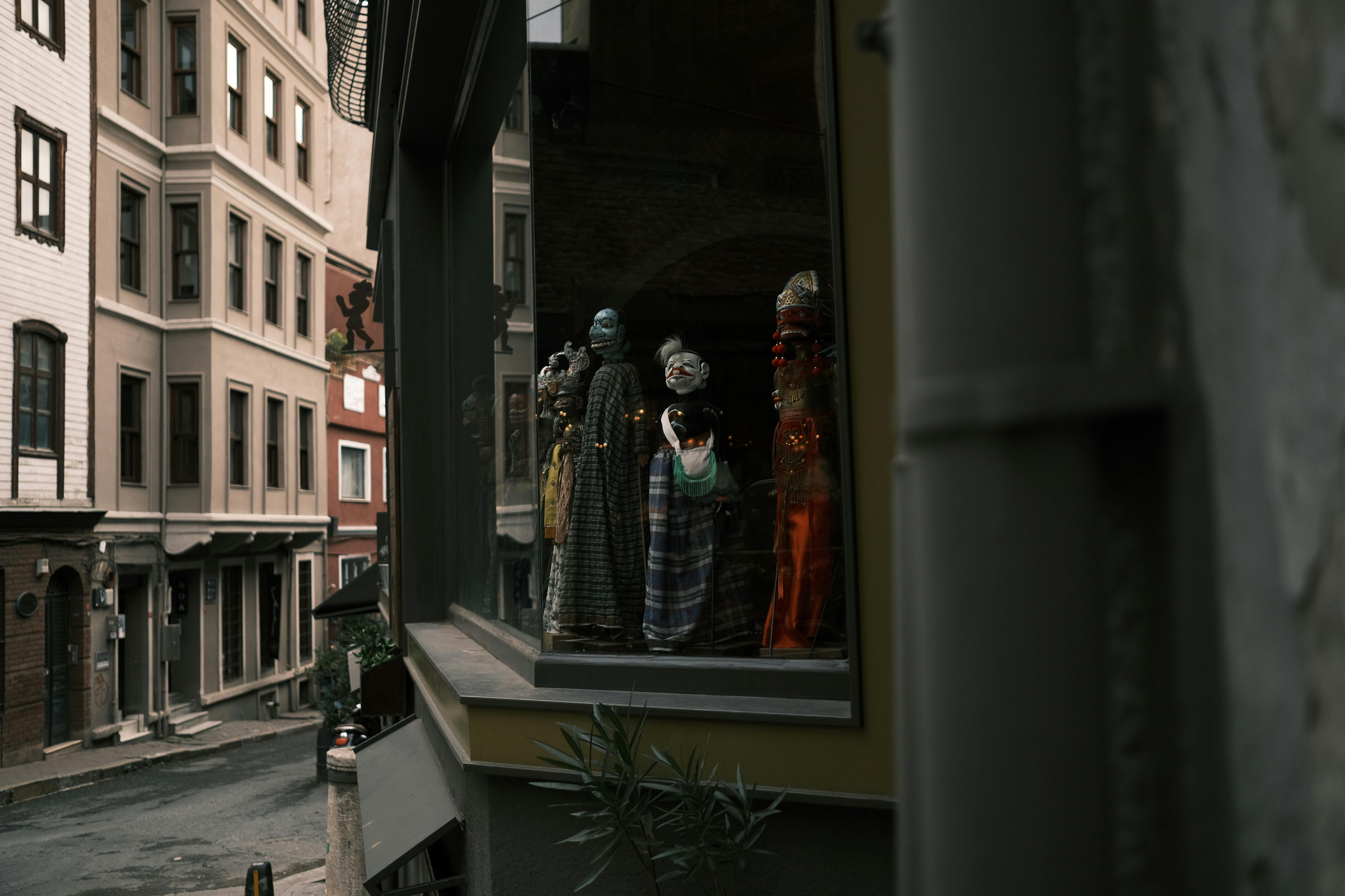 Dolls Behind a Window · Free Stock Photo