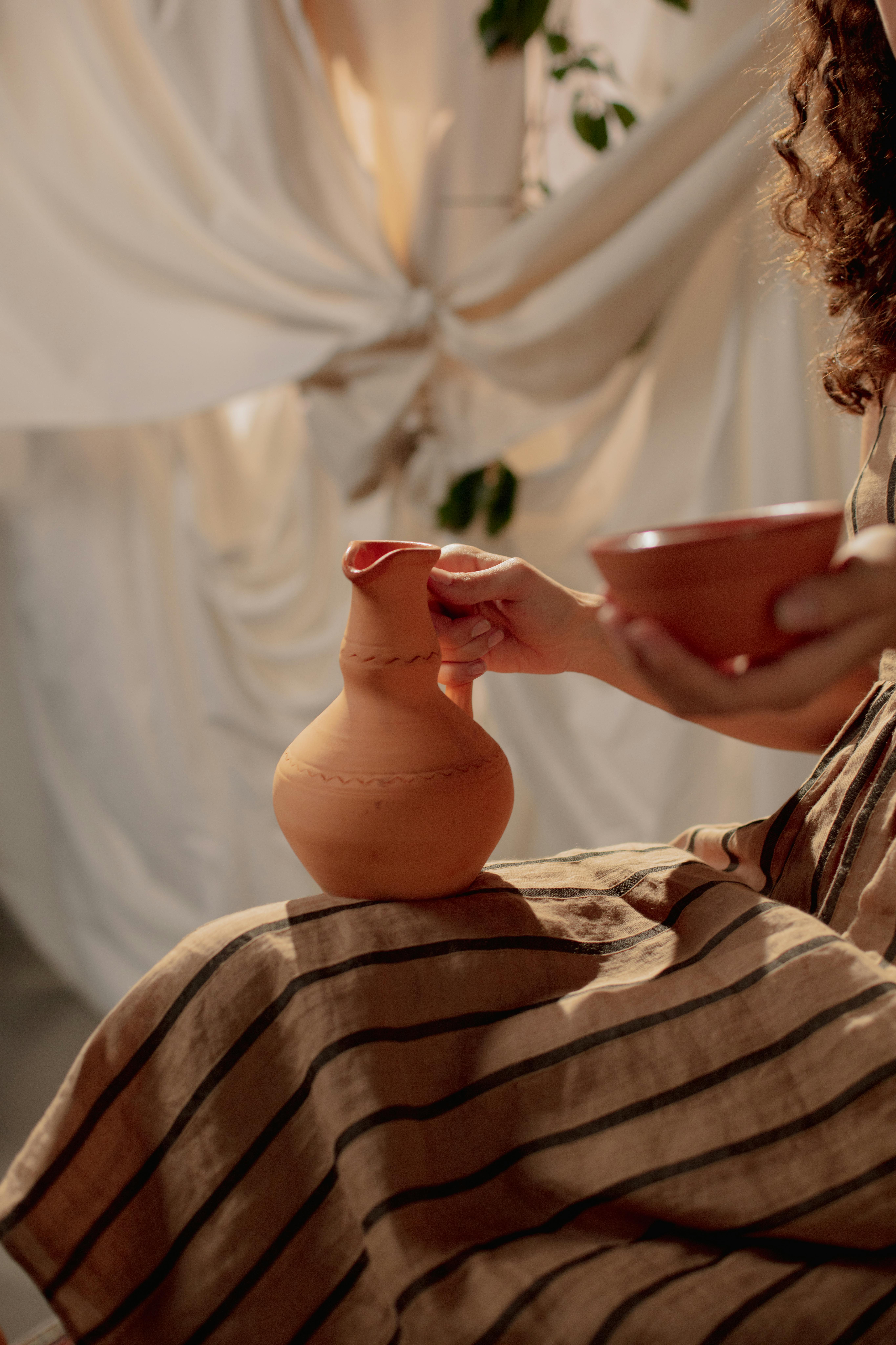 Holding A Jug Photos, Download The BEST Free Holding A Jug Stock Photos ...