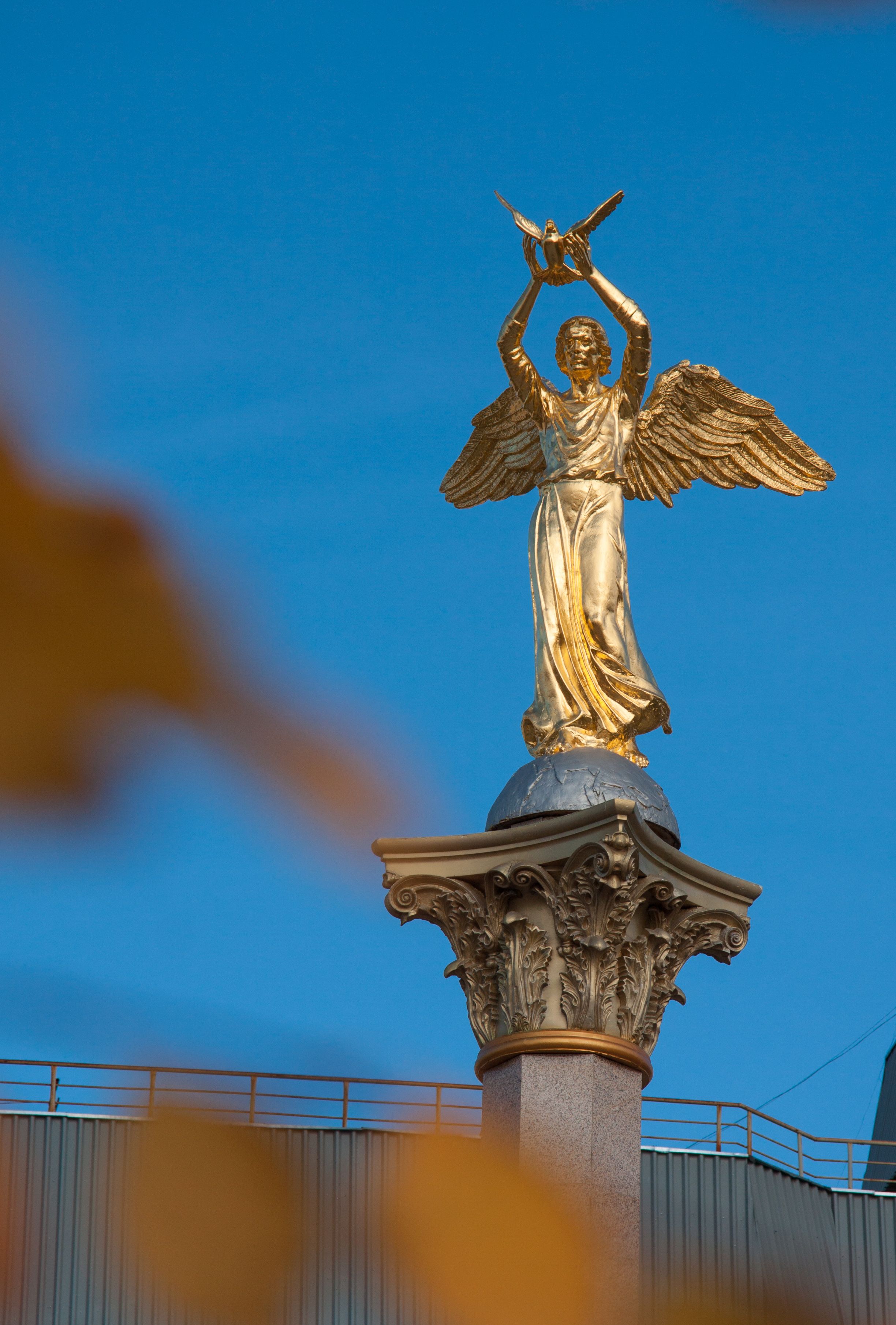 Golden Statue of an Angel under Blue Sky · Free Stock Photo