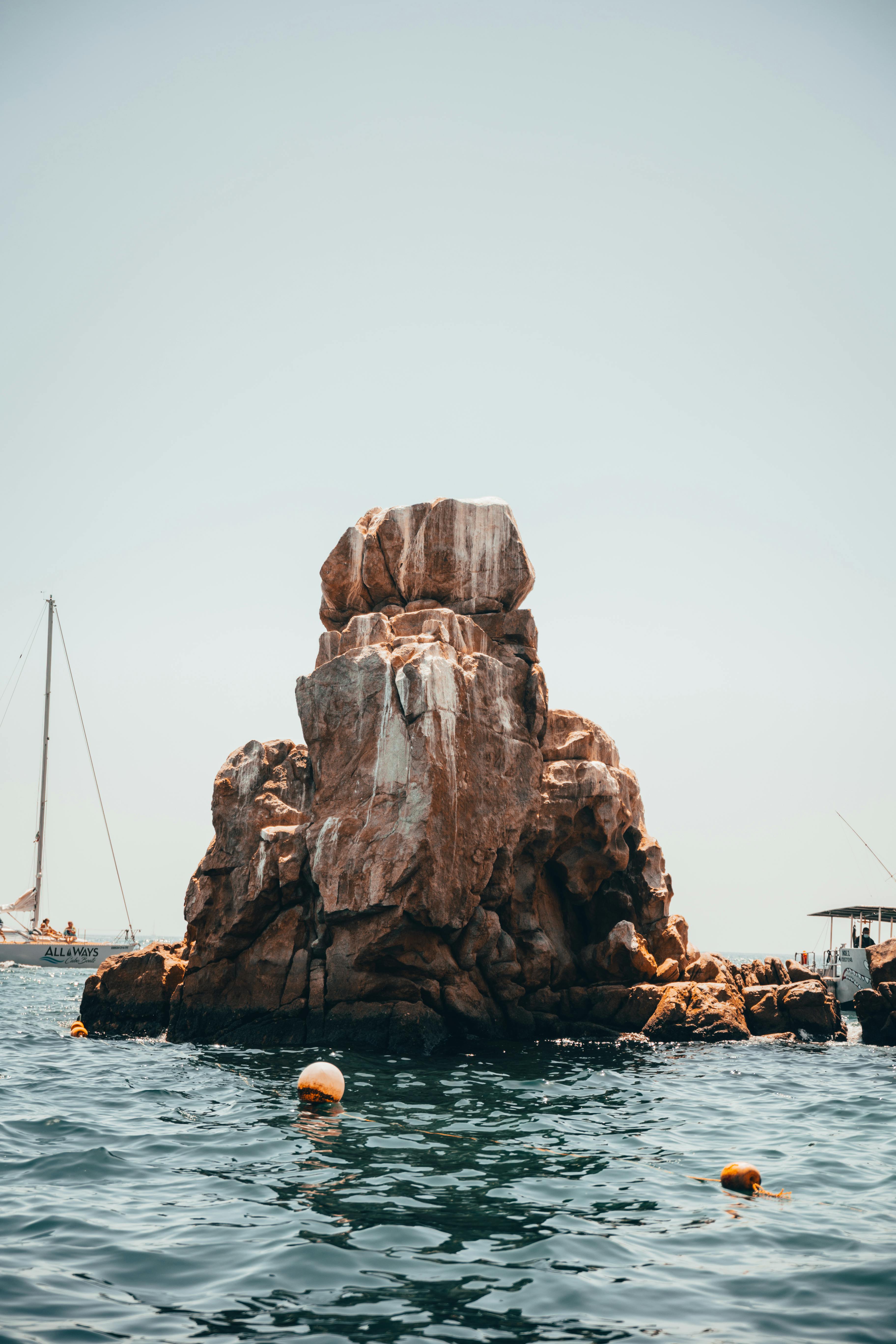 Clear Sky over Barren Rock · Free Stock Photo