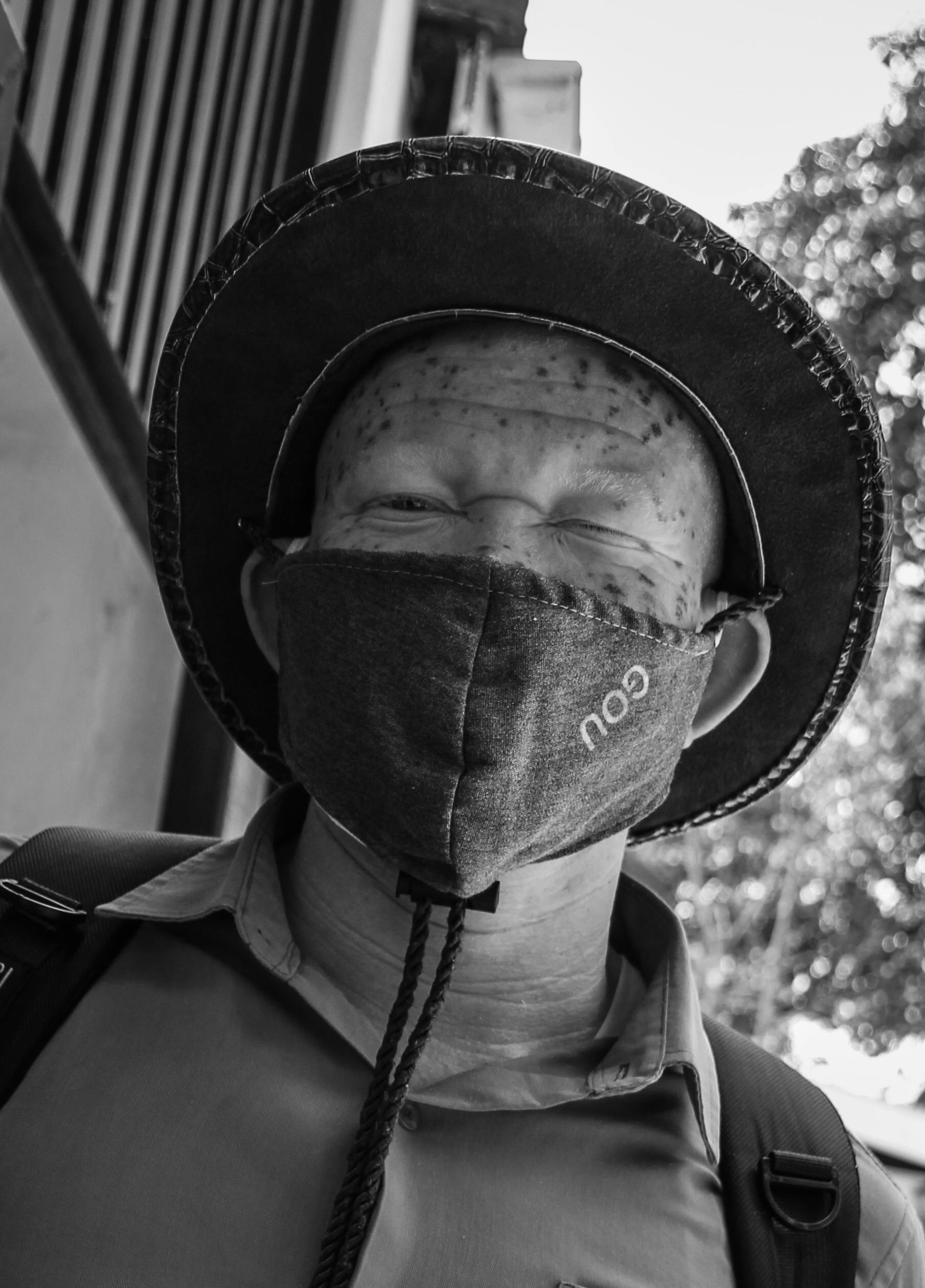 Elderly Men Wearing Face Masks Praying Together · Free Stock Photo