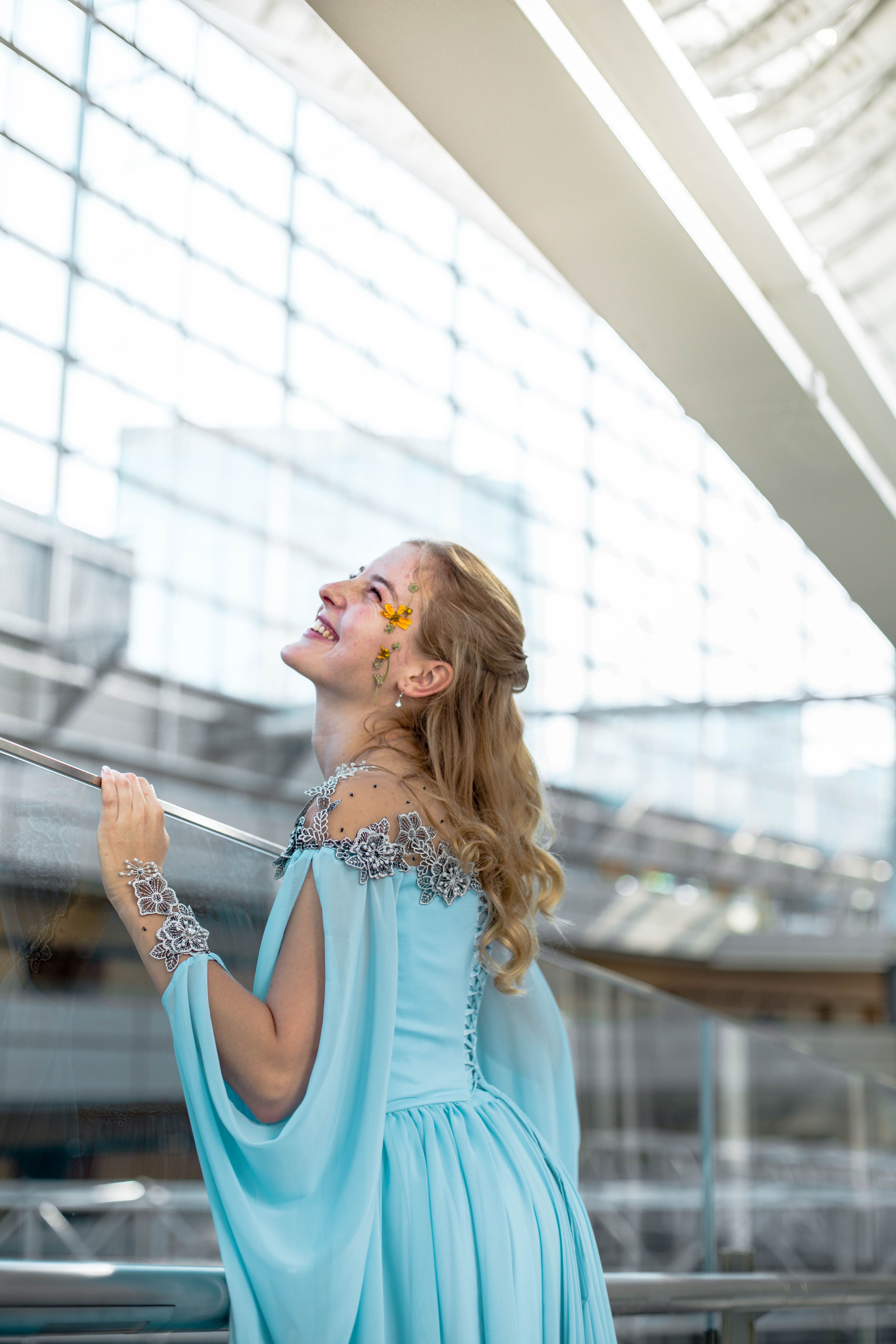 A Happy Woman in a Blue Dress · Free Stock Photo