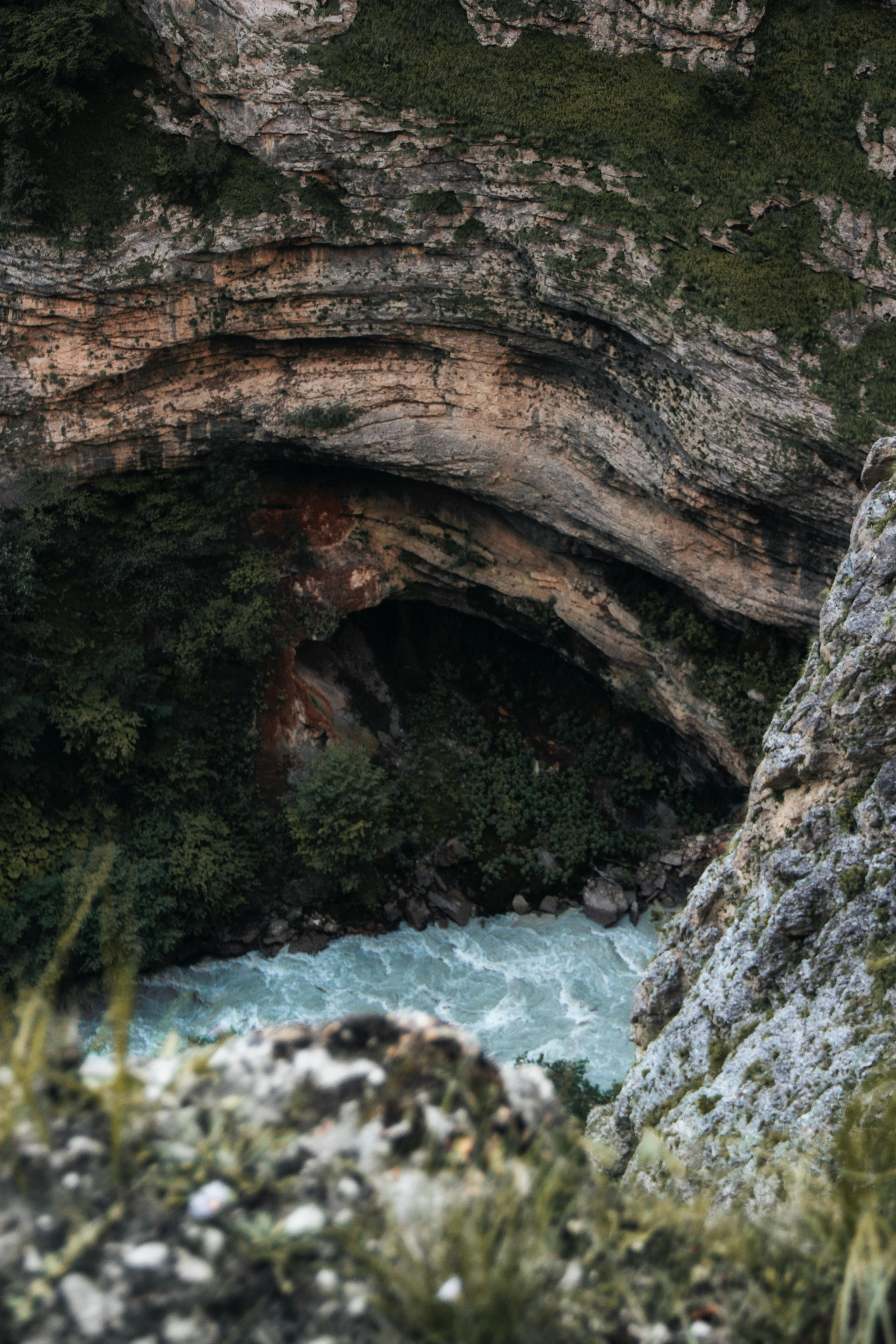 River Below a Cliff · Free Stock Photo