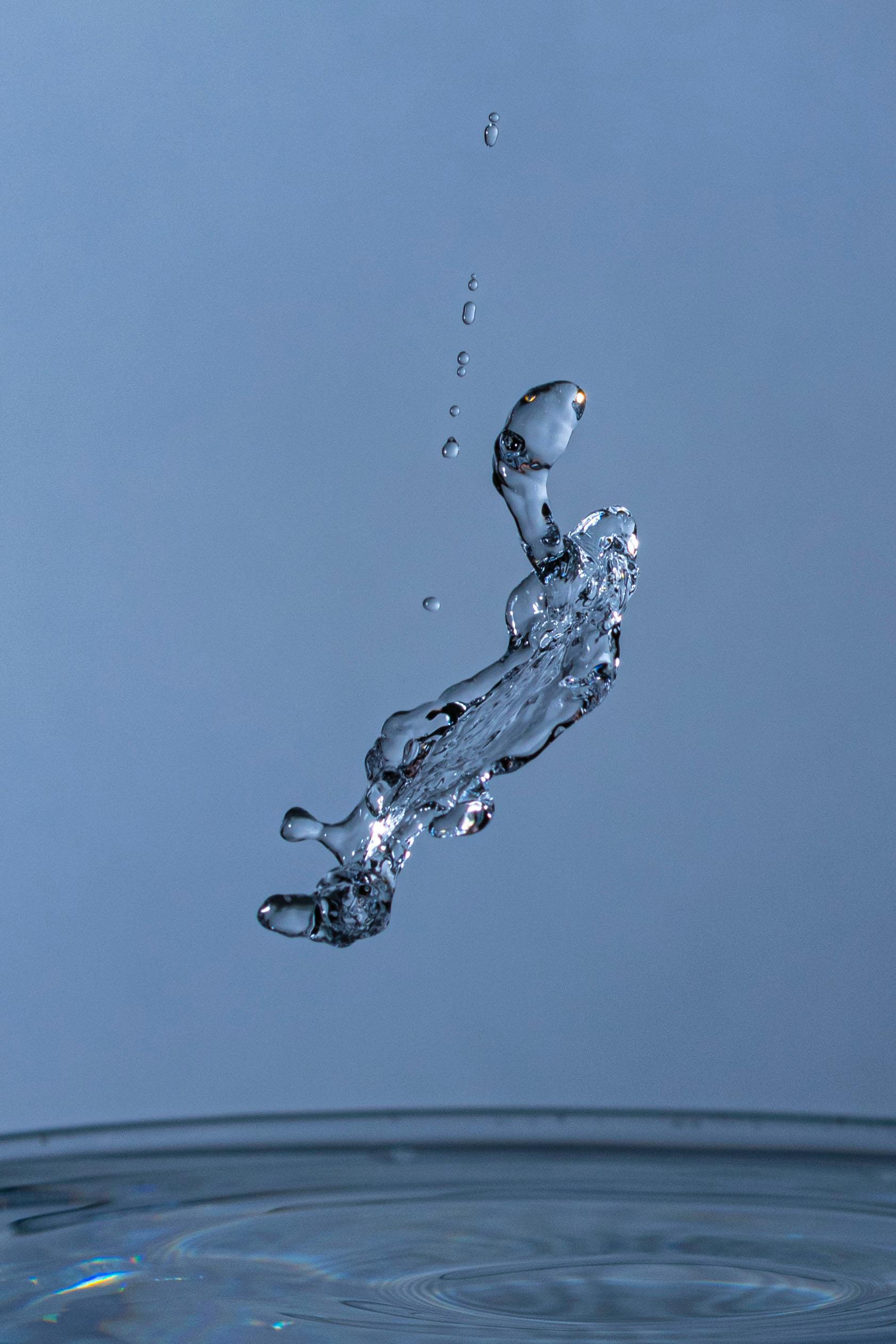 Waterdrops over a Basin · Free Stock Photo