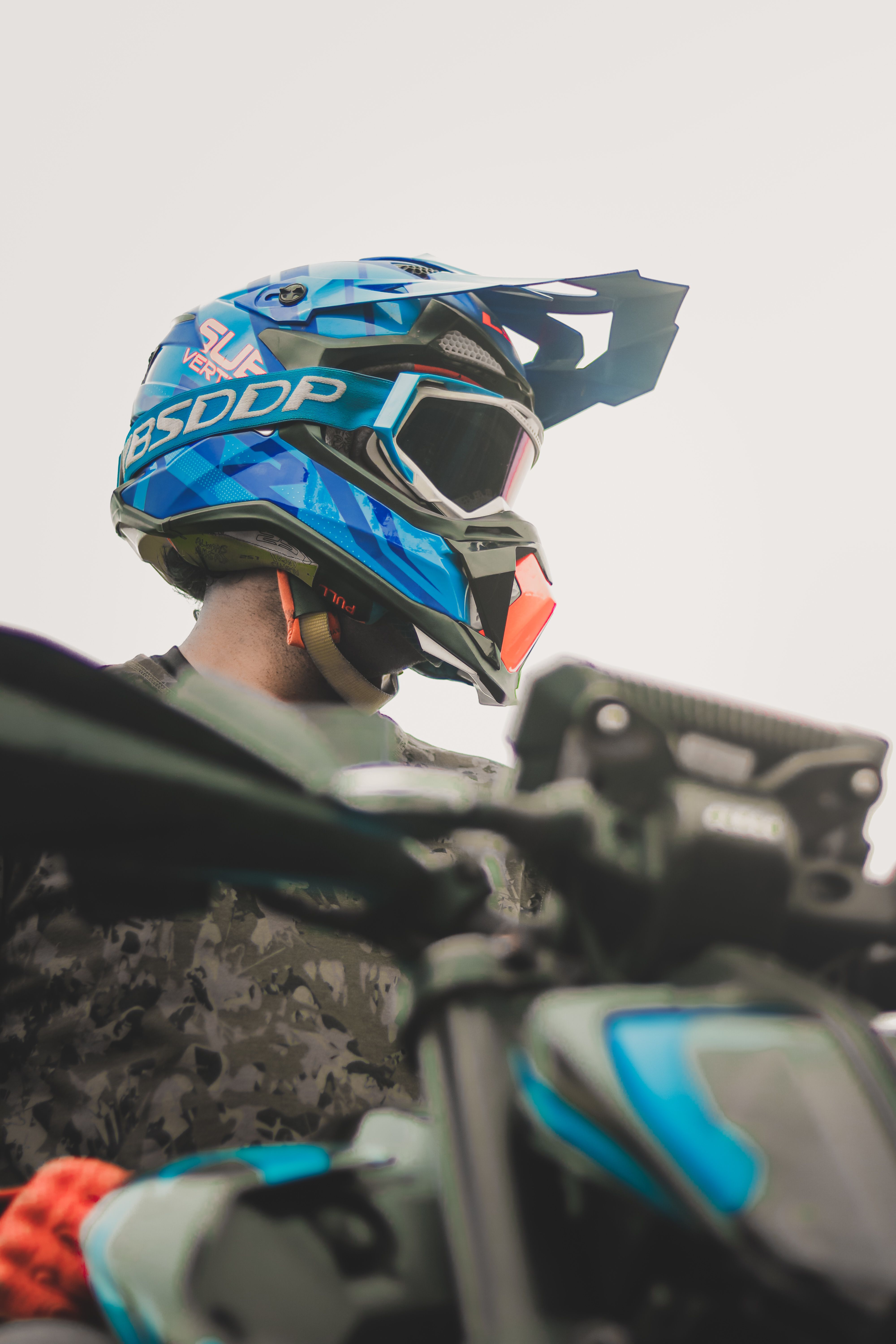 A Man Wearing a Blue Helmet · Free Stock Photo