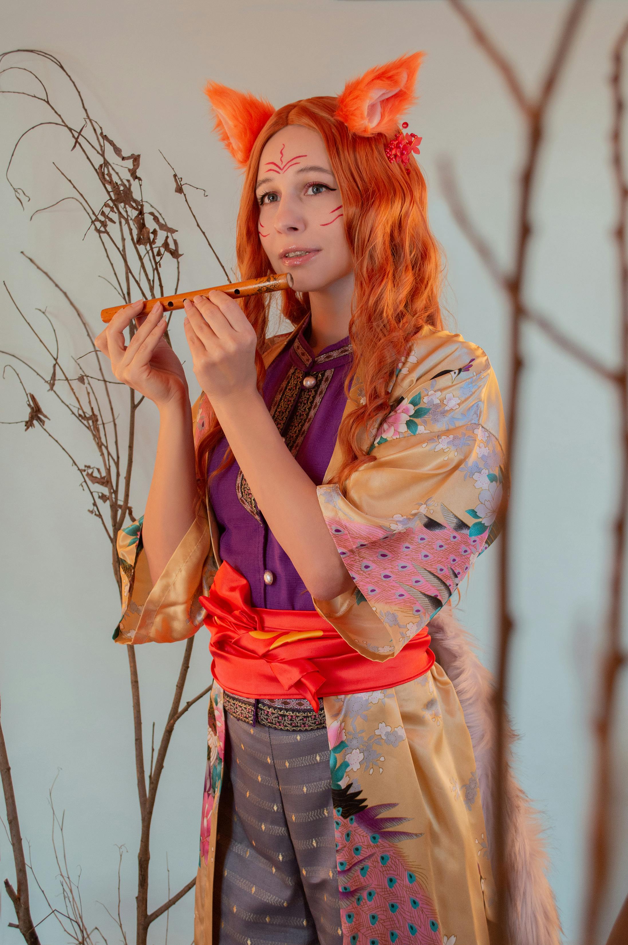 Female Cosplayer holding a Flute · Free Stock Photo