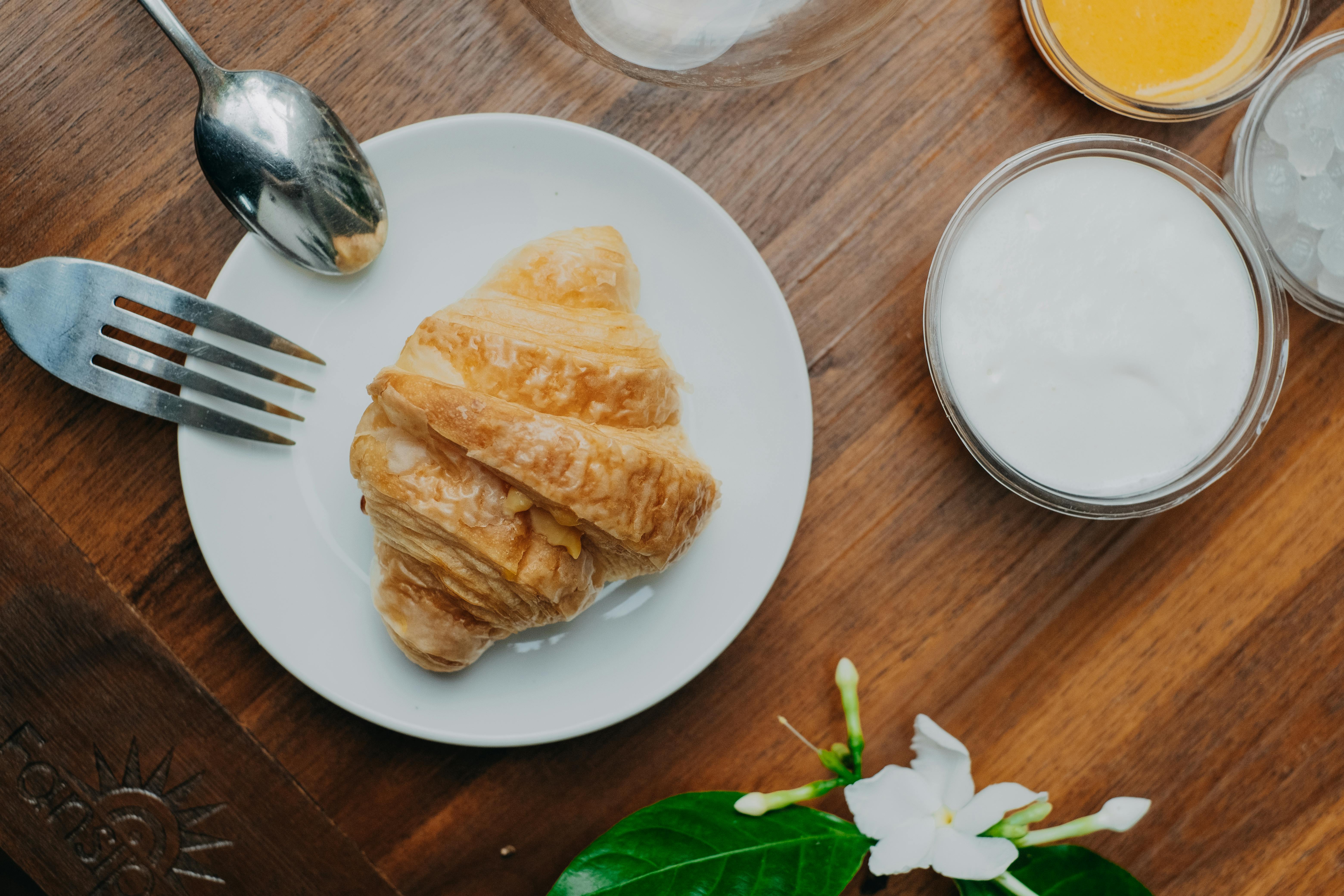 A Delicious Croissant on a Plate · Free Stock Photo