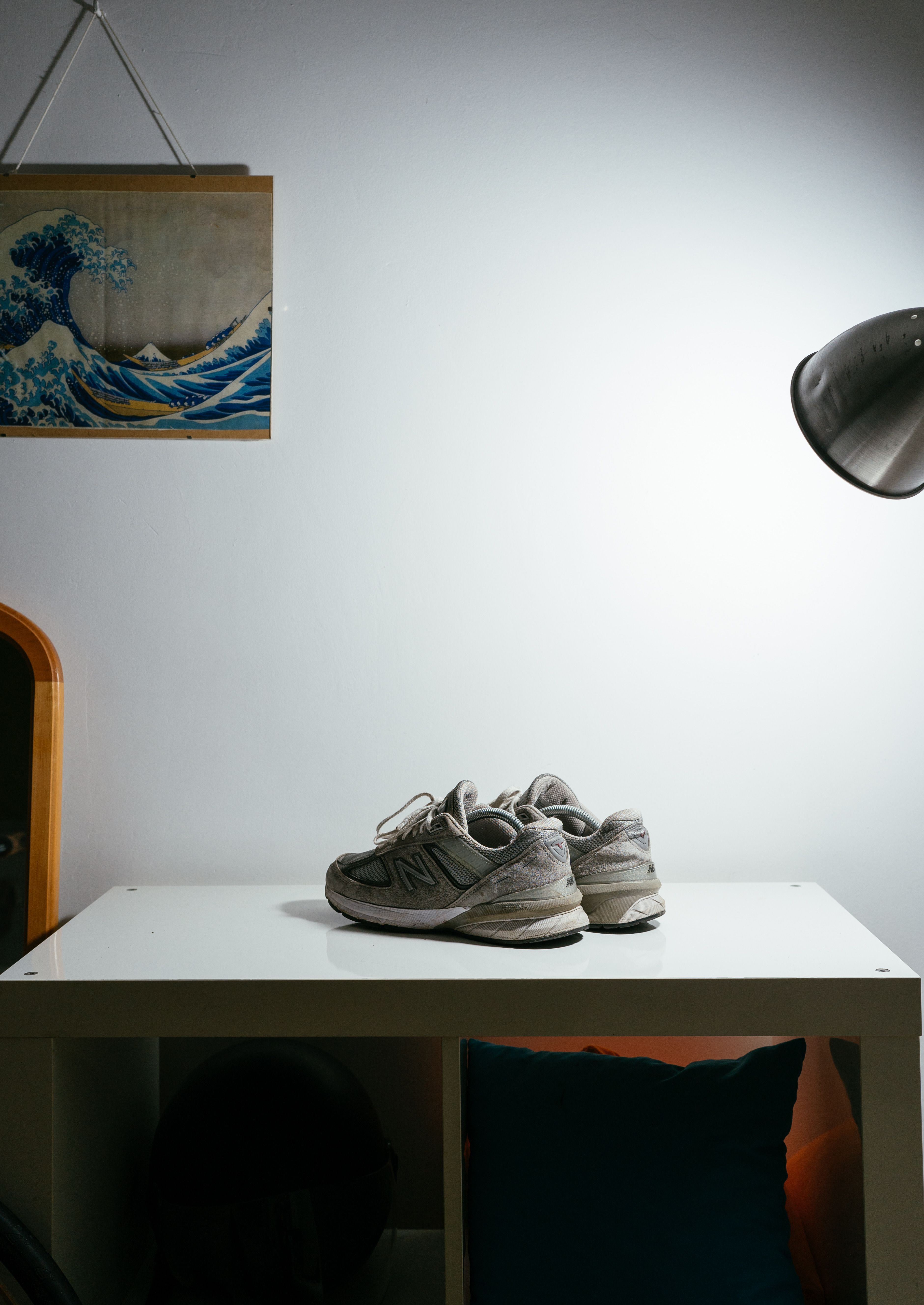 A Sneakers on White Table · Free Stock Photo