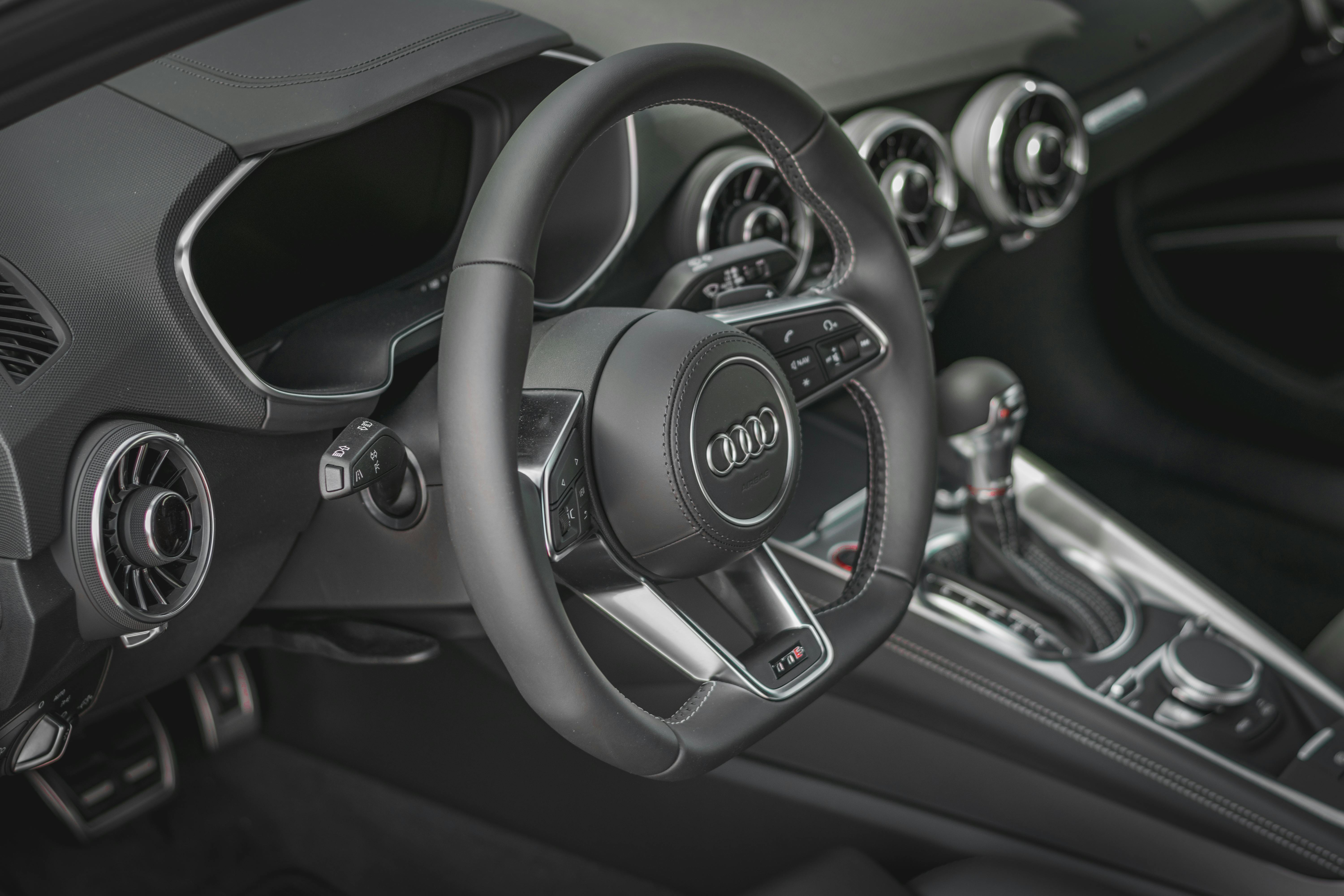 A Black Steering Wheel Inside the Car · Free Stock Photo