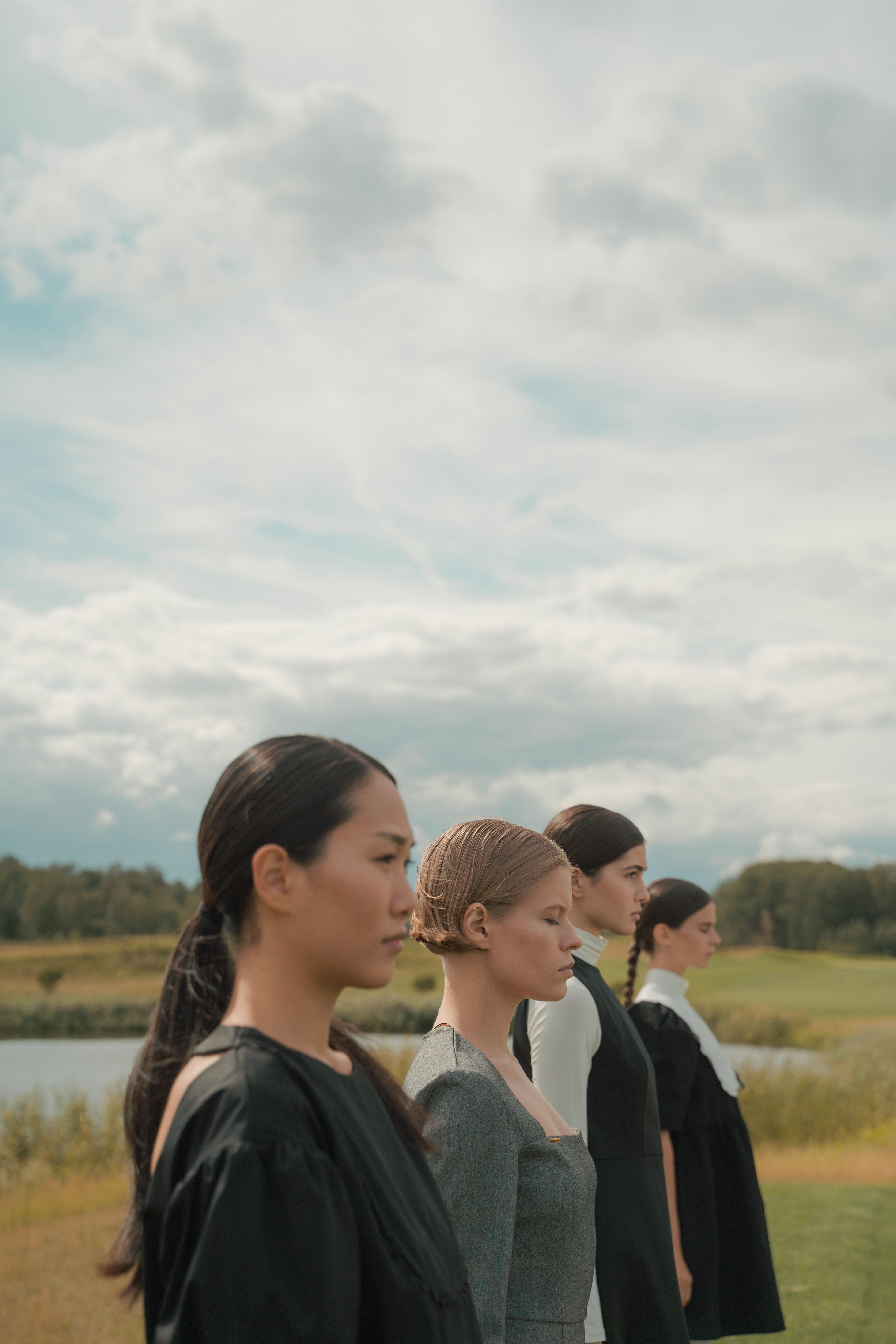 Women Standing on the Grass Field · Free Stock Photo
