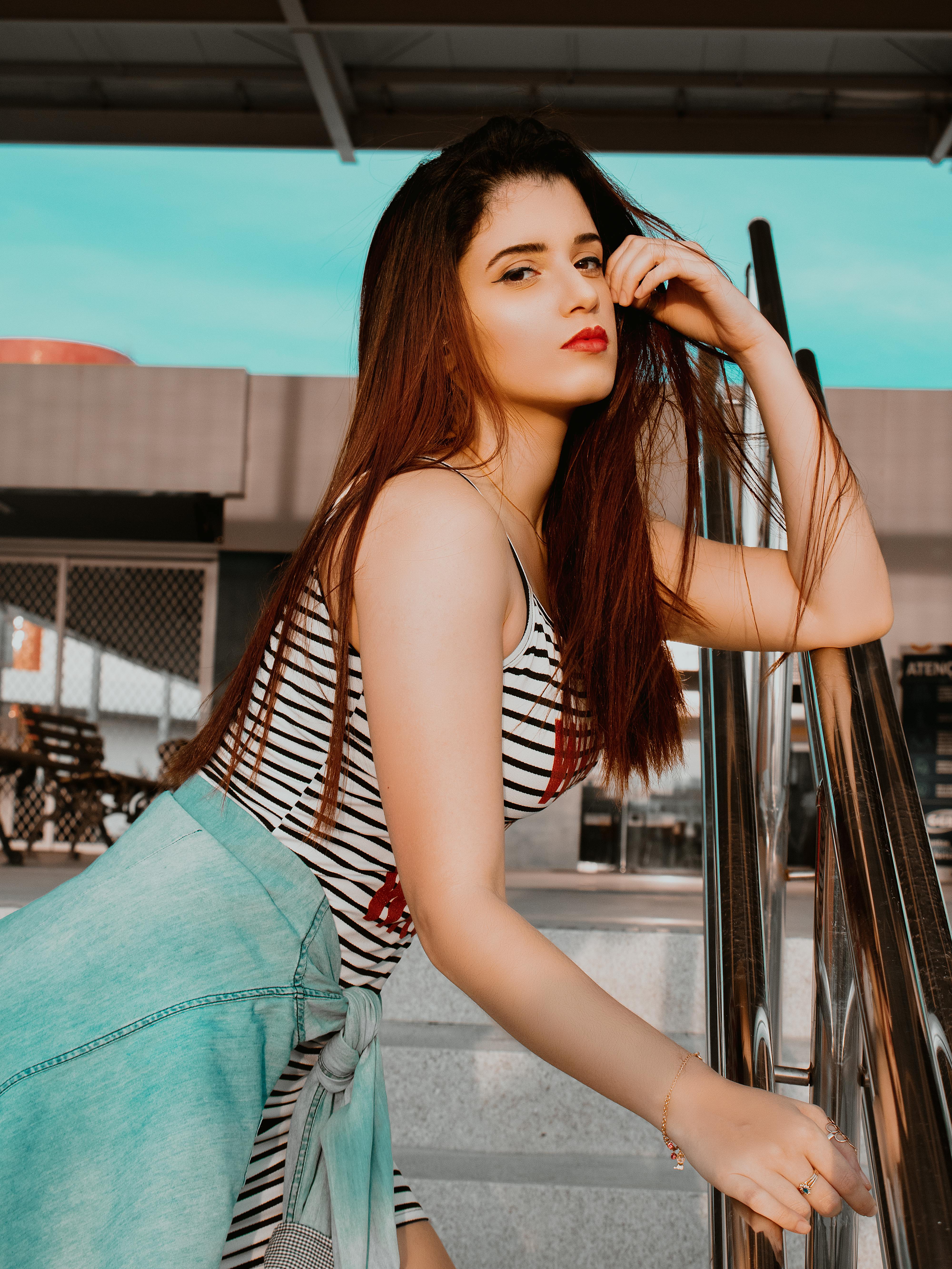 Woman Posing by Handrail · Free Stock Photo