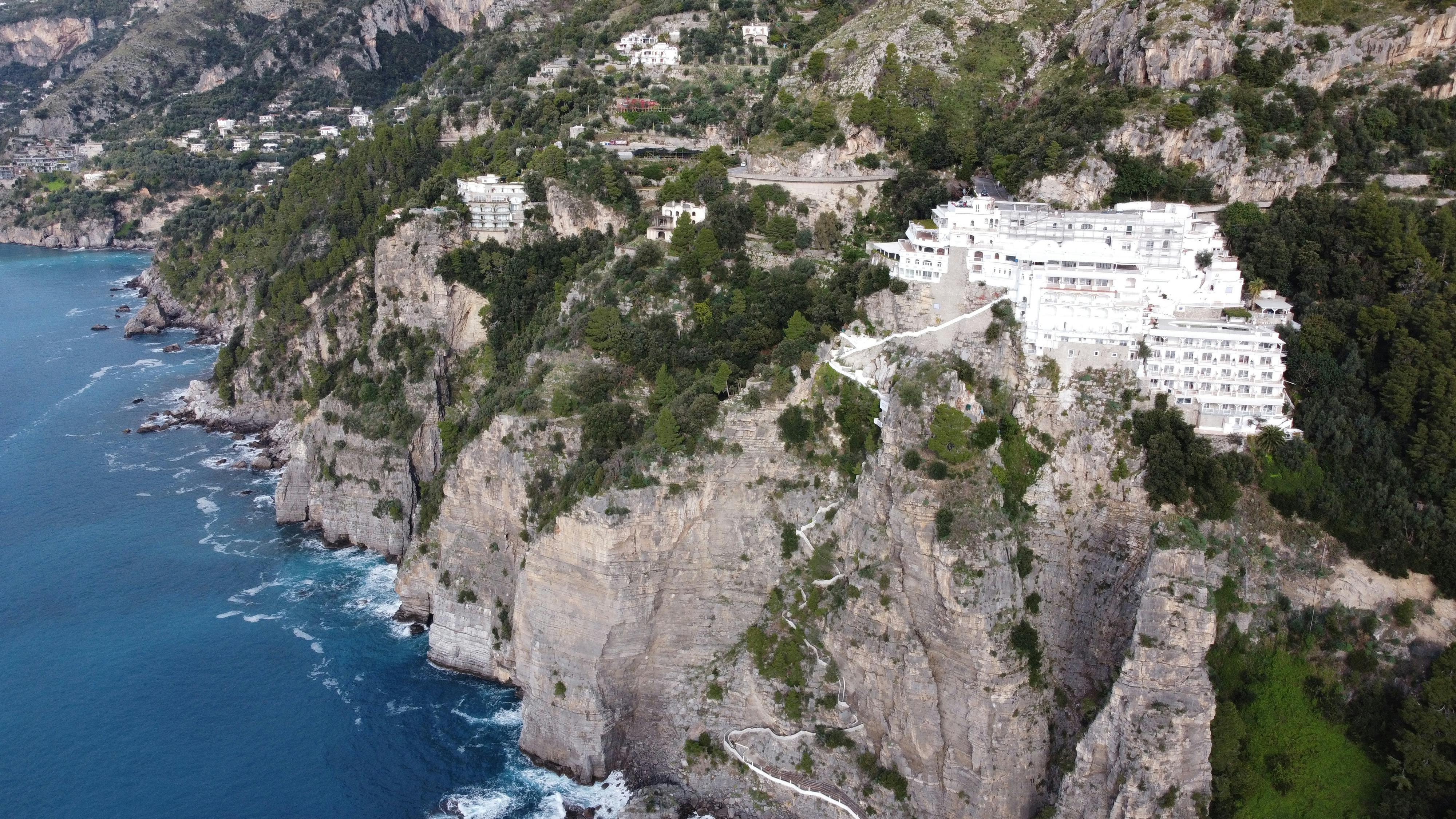 Aerial Photo of Building on Cliff · Free Stock Photo