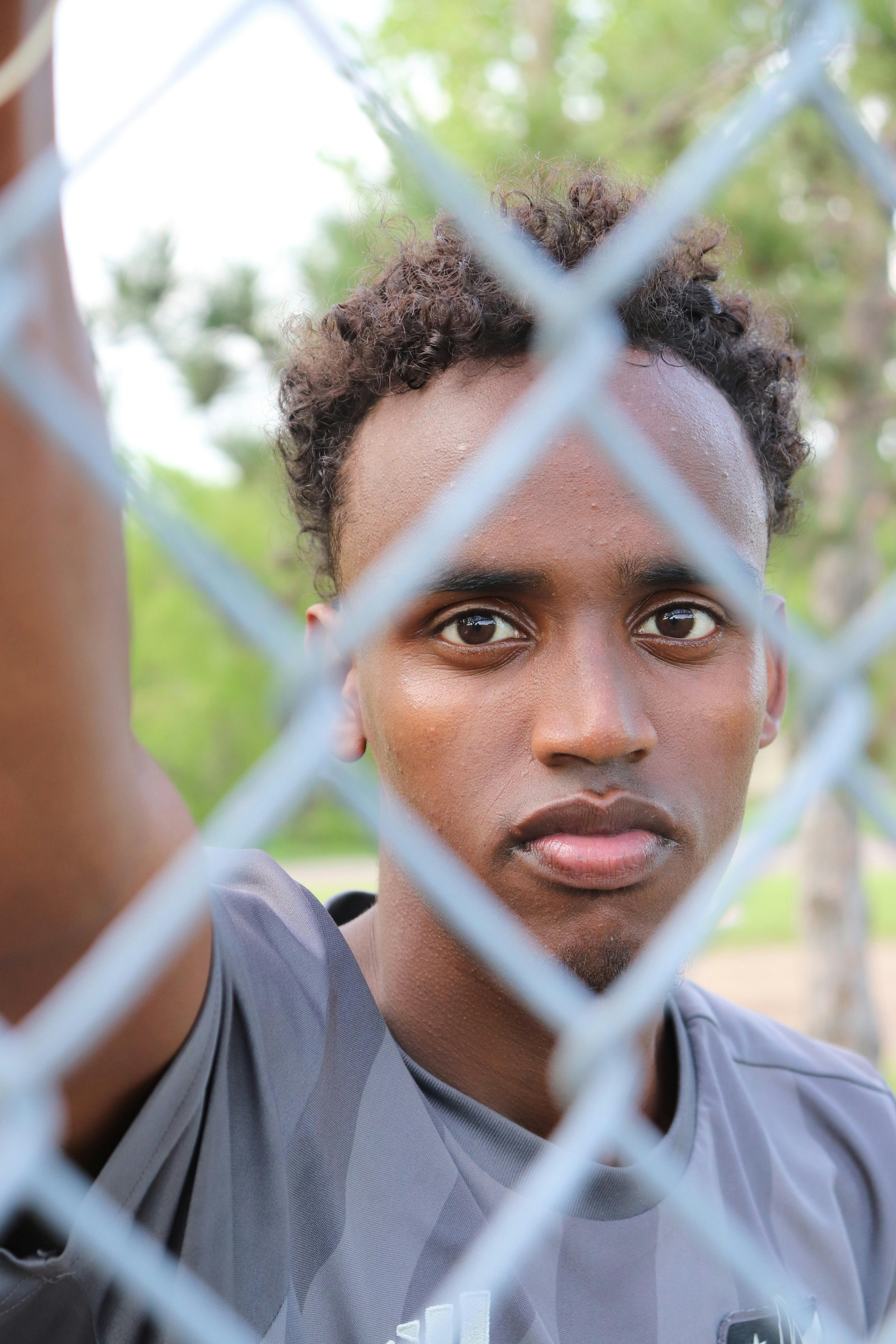 Man Behind Fence Photos, Download The BEST Free Man Behind Fence Stock ...