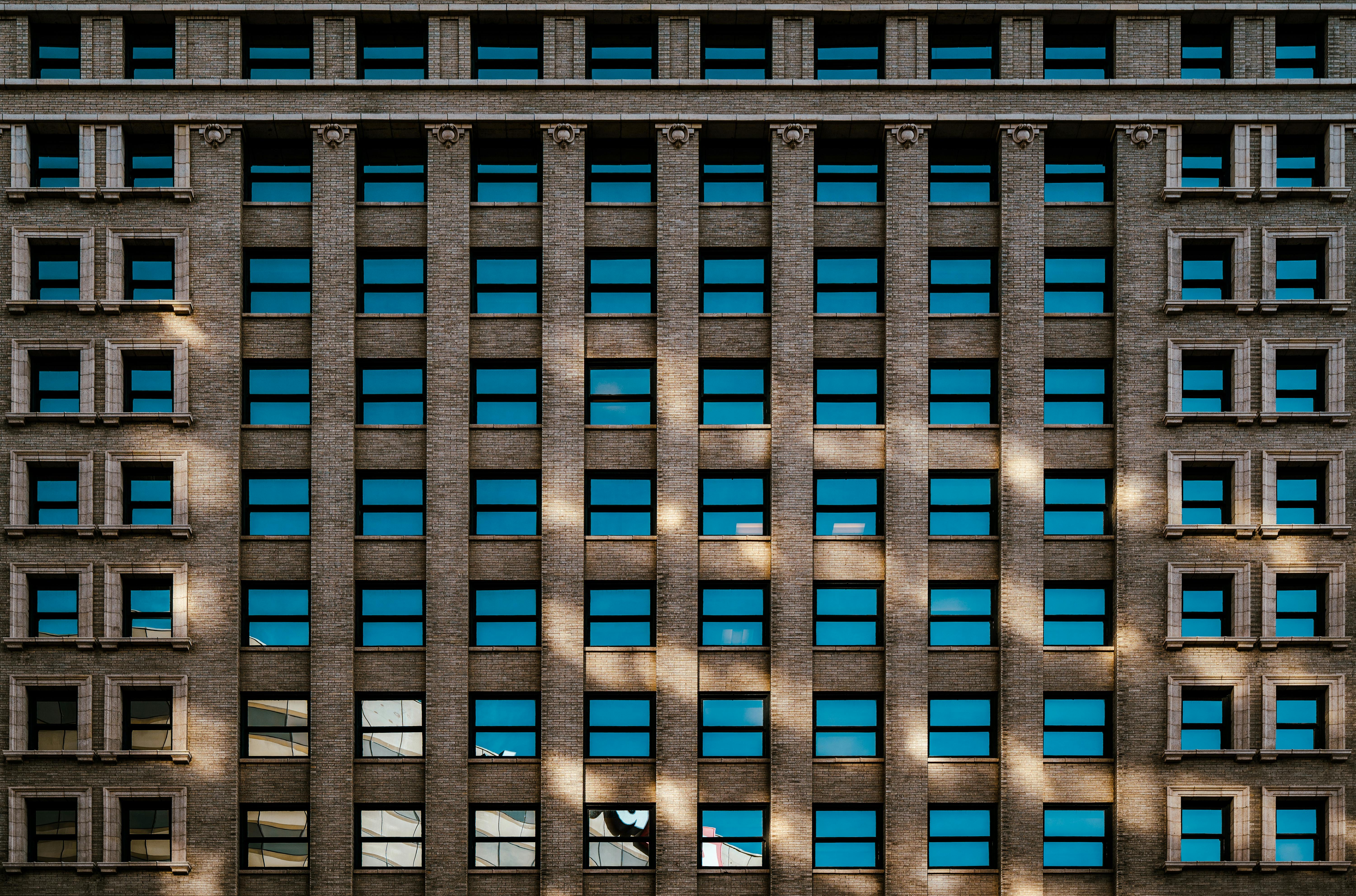 Exterior of a Building with Glass Windows · Free Stock Photo
