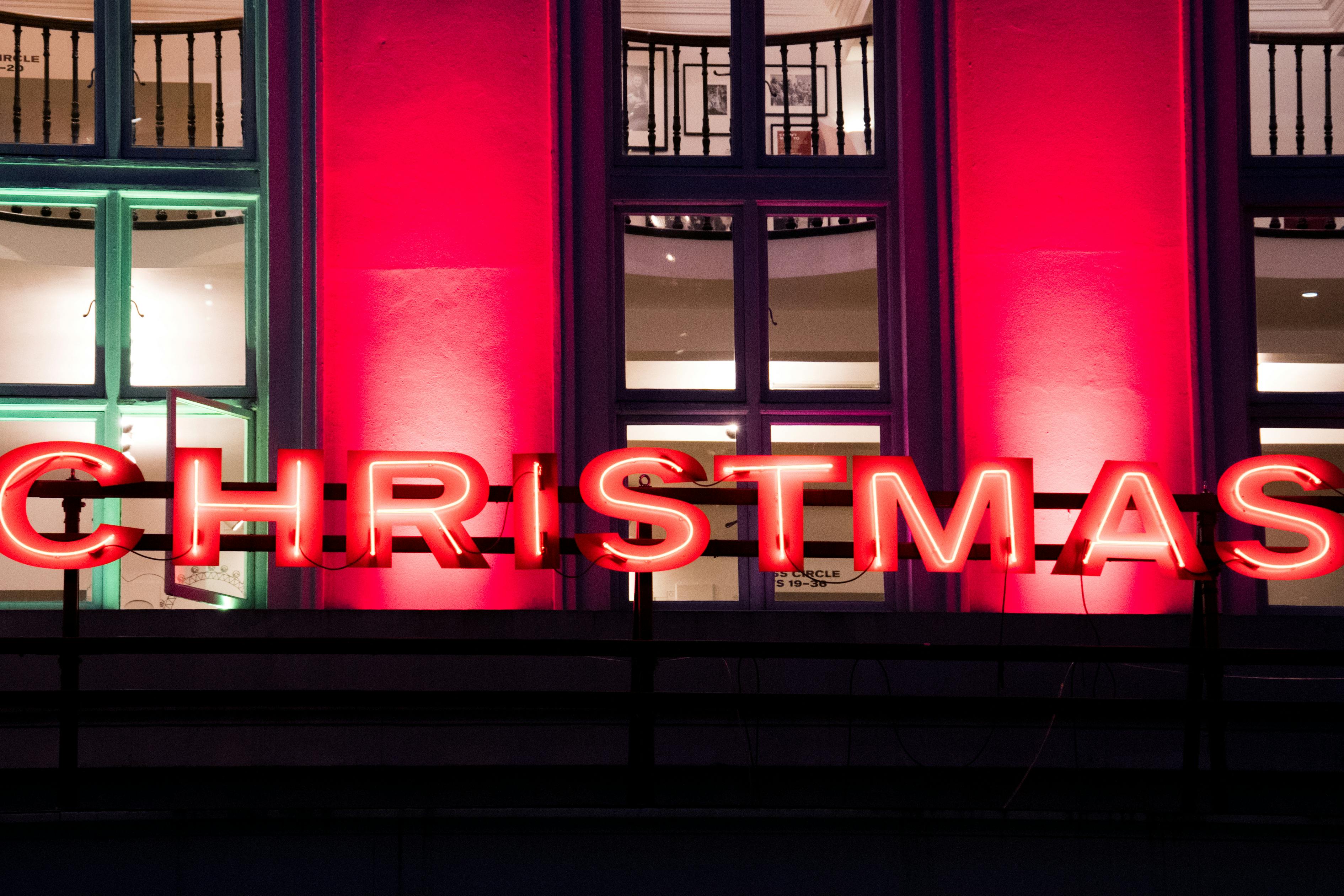 Neon Signage Near the Glass Windows · Free Stock Photo