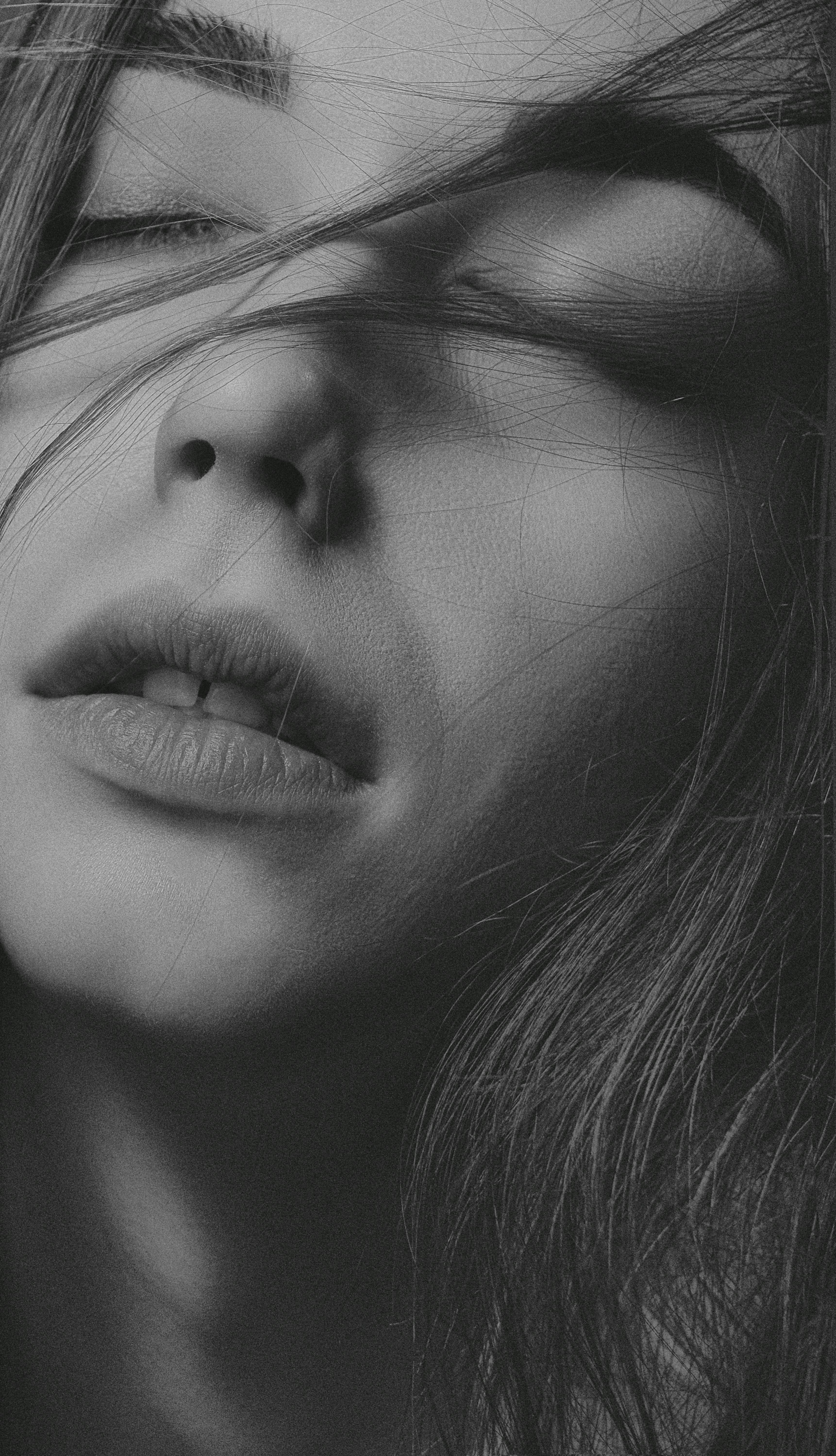 Grayscale Photo of a Woman's Face · Free Stock Photo