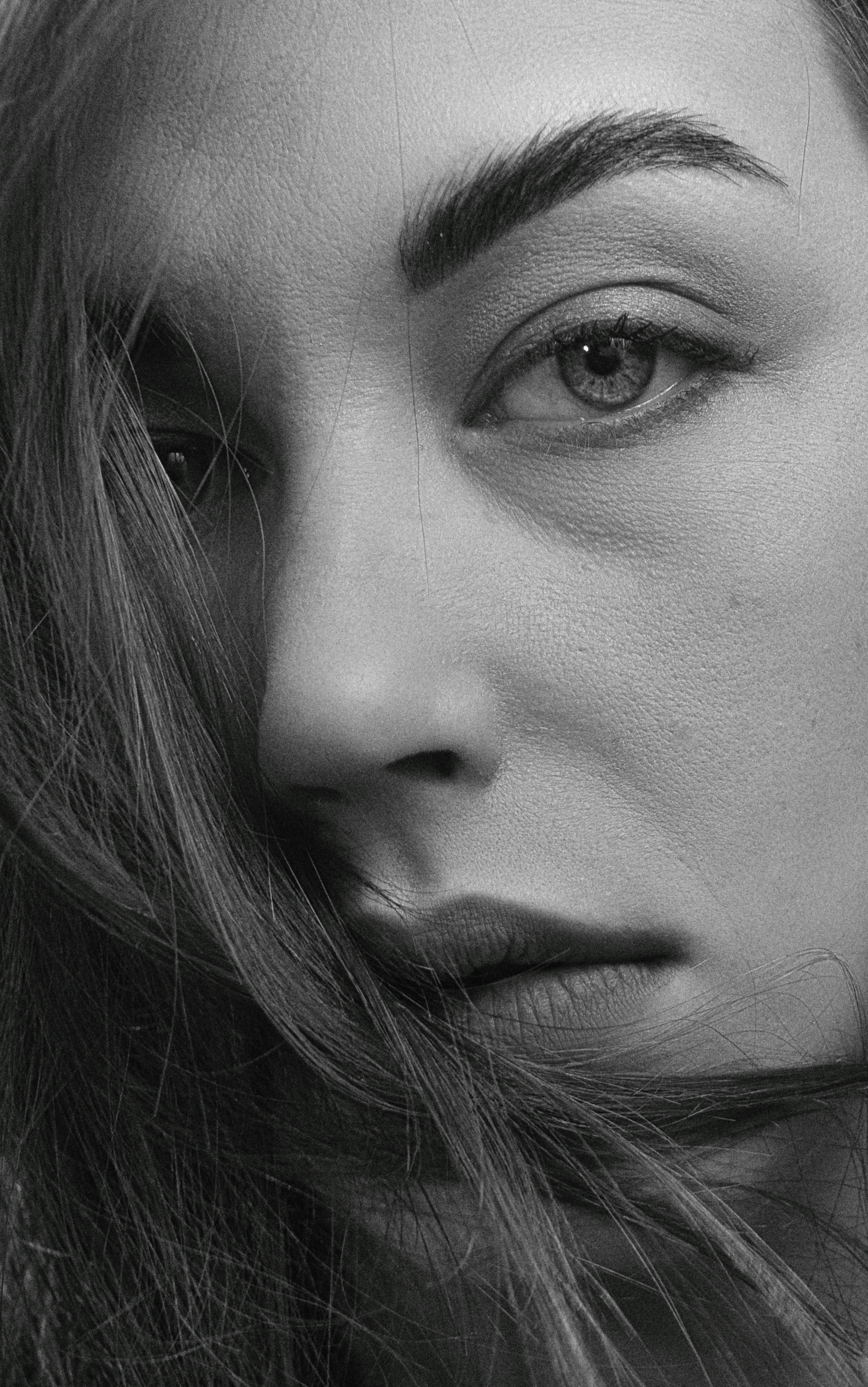 Grayscale Photo of a Woman's Face · Free Stock Photo