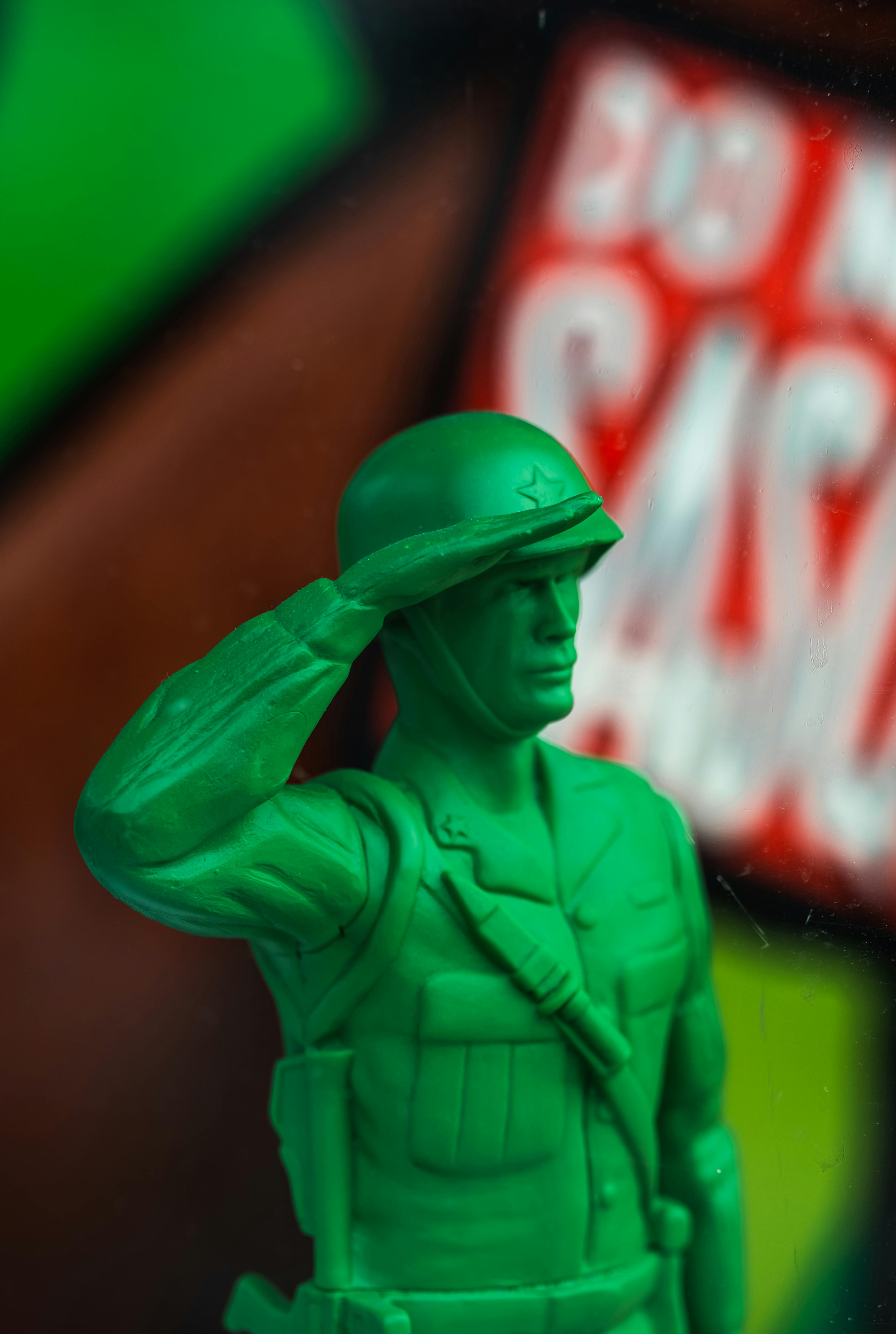 Green Toy Soldier in Close-up Photography · Free Stock Photo