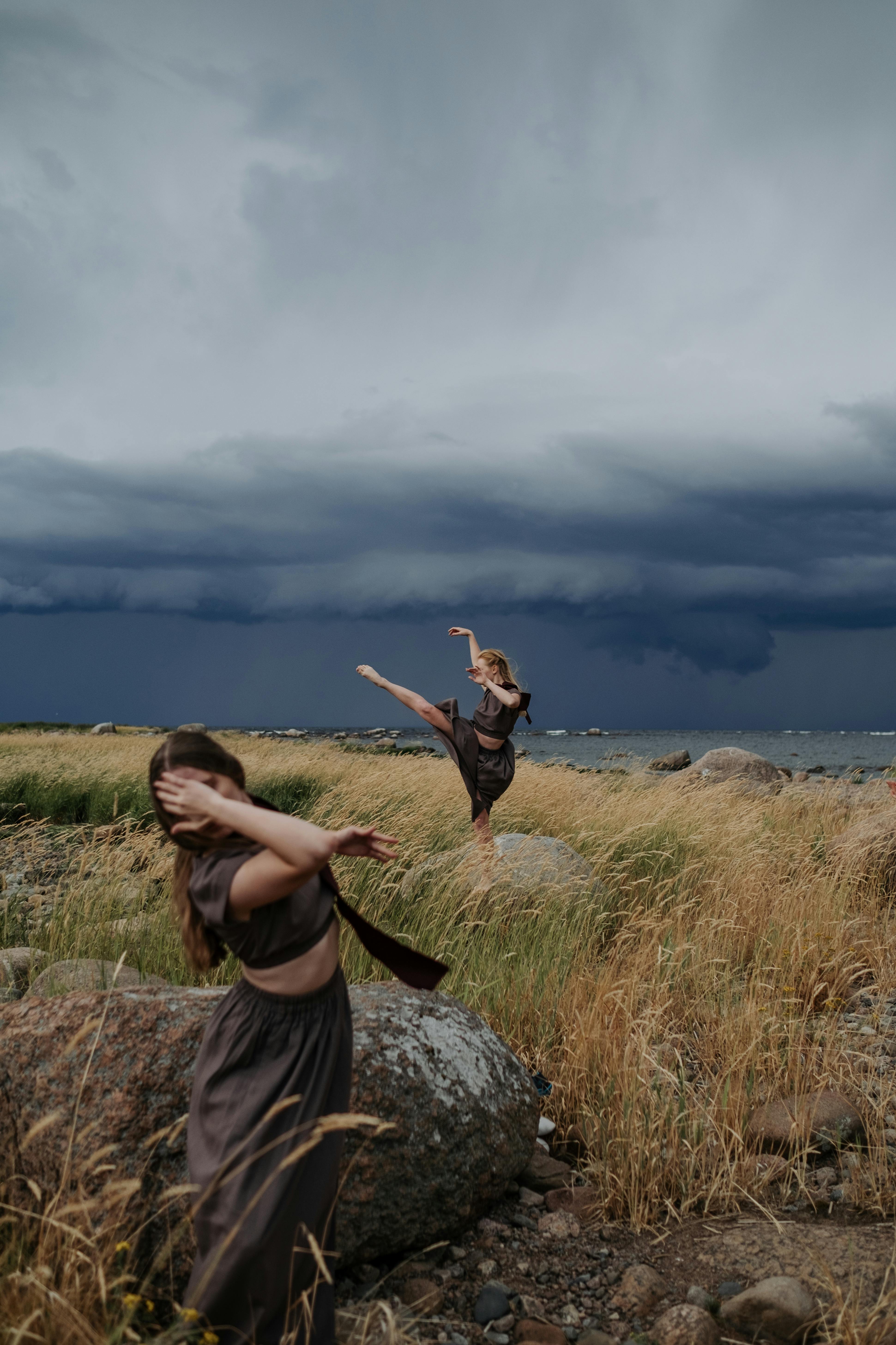 Women Contemporary Dancing on a Grass Field · Free Stock Photo